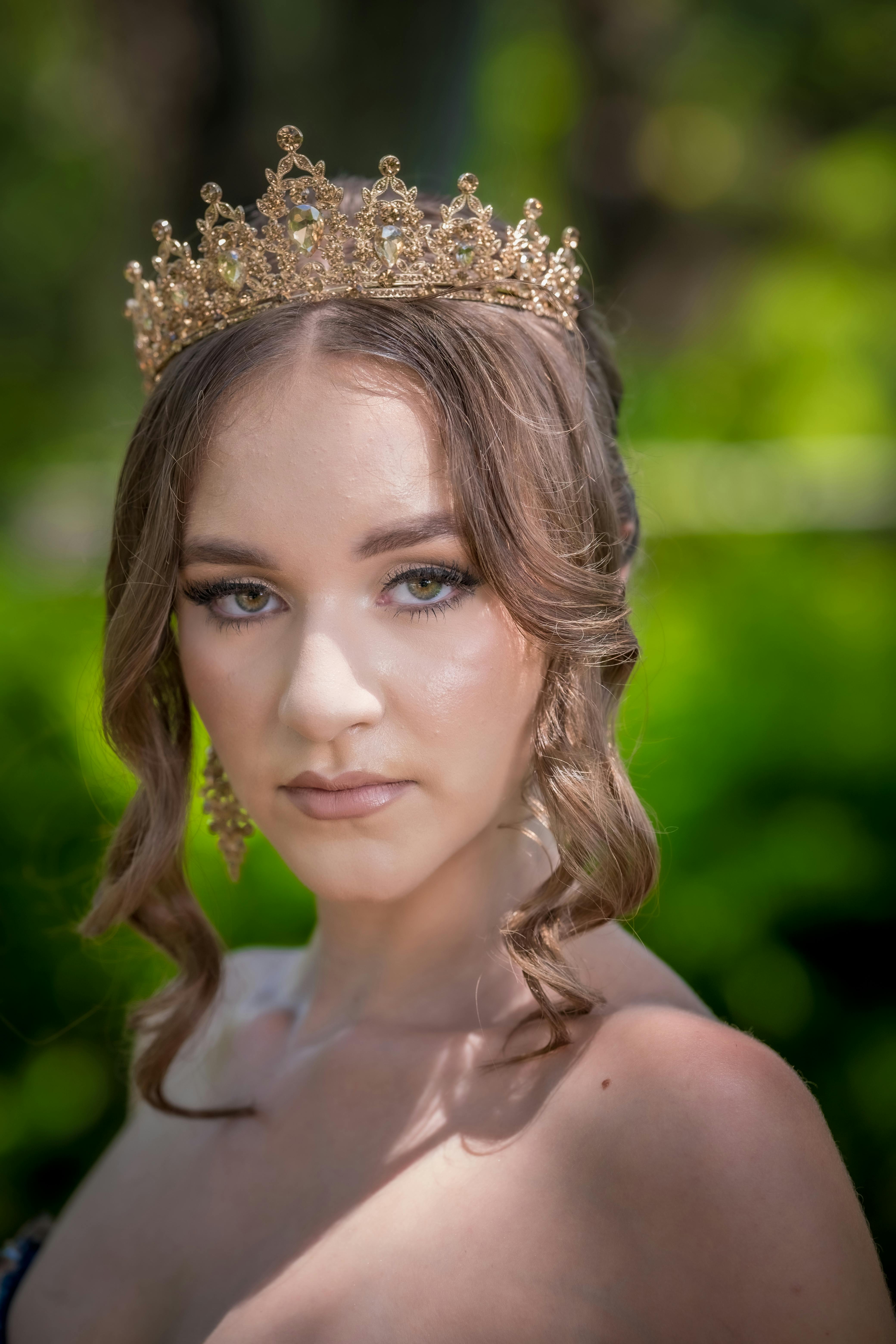 Elegant Woman in Golden Crown Portrait · Free Stock Photo