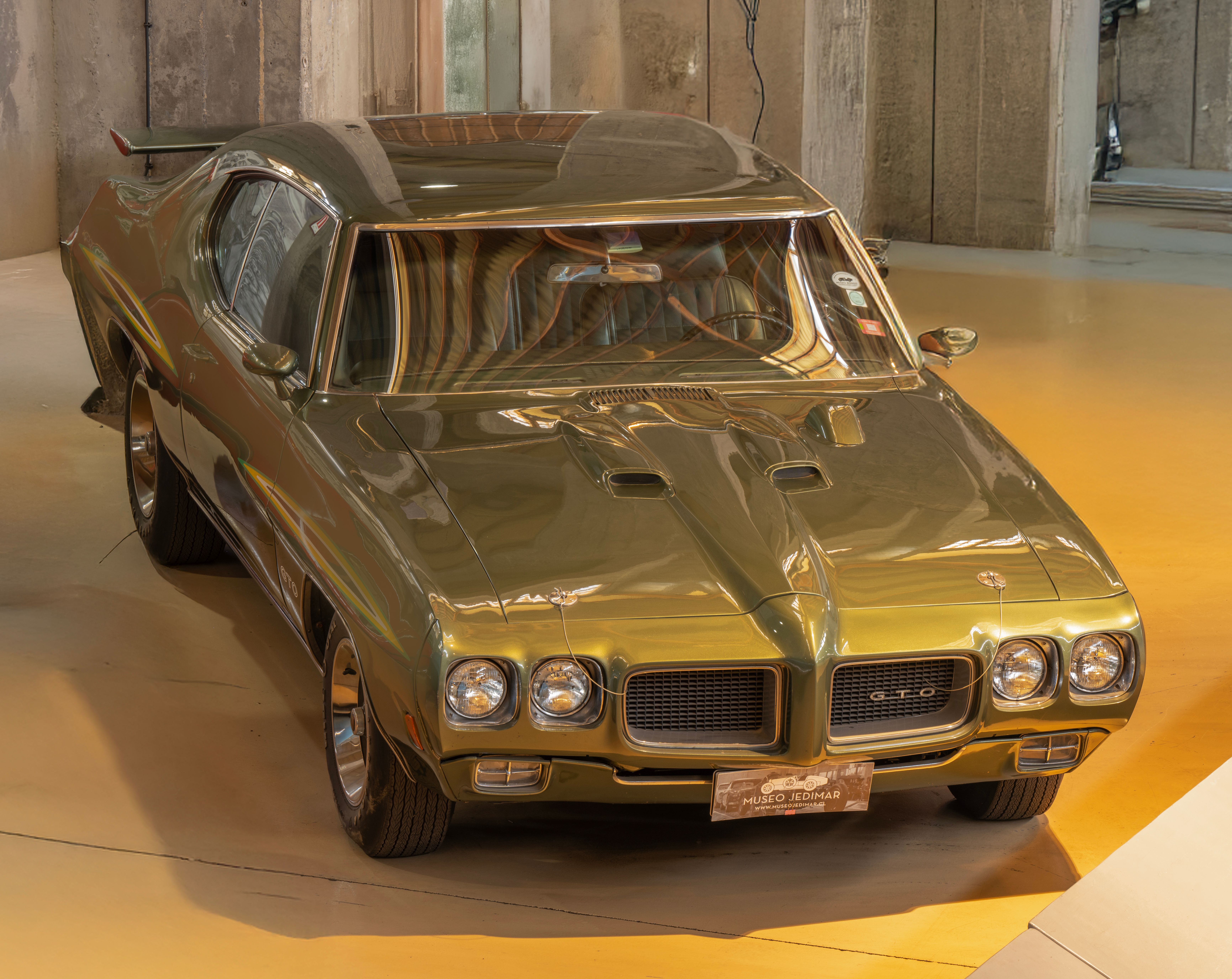 Classic Pontiac GTO in Indoor Setting · Free Stock Photo