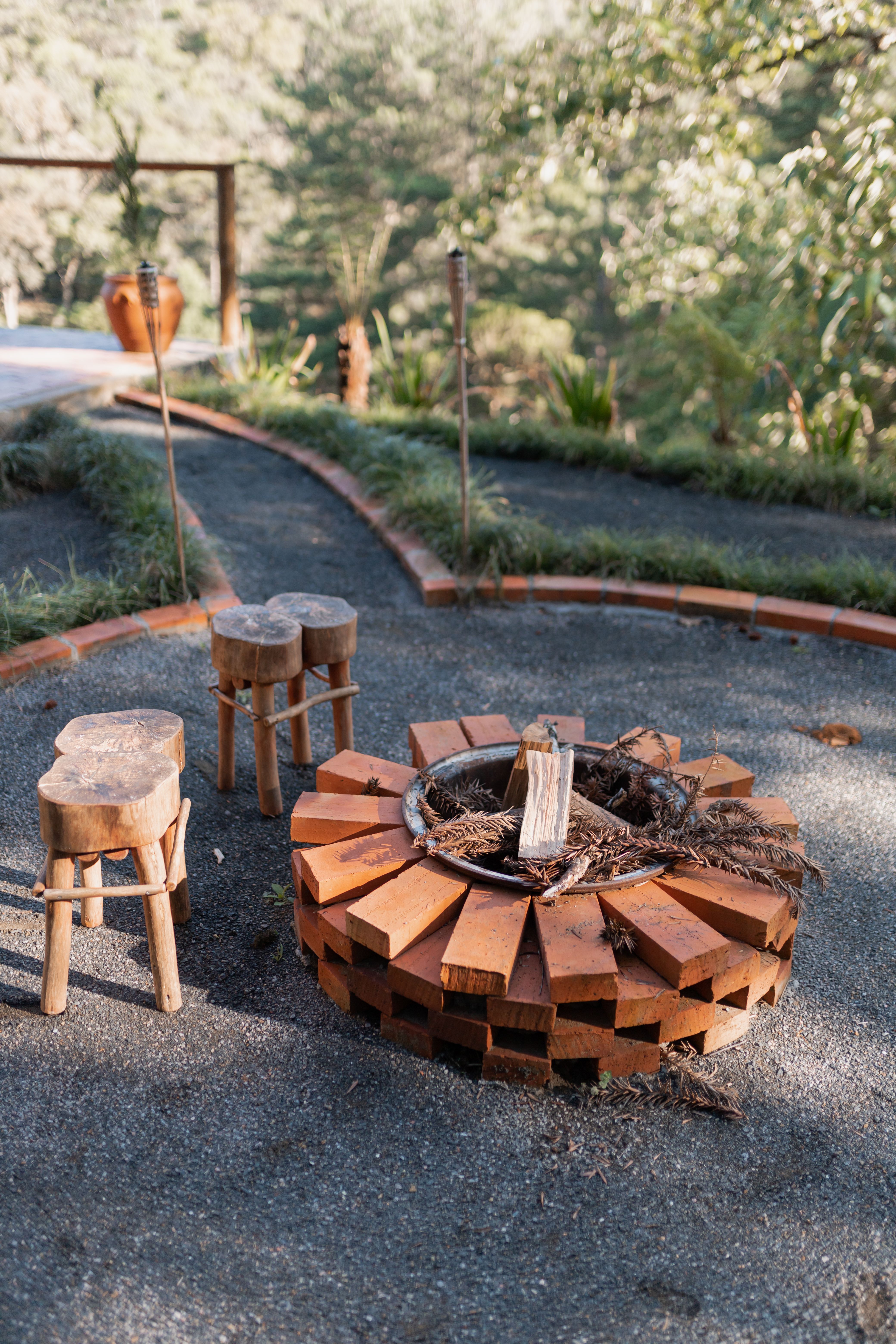 Outdoor Rustic Fire Pit with Wooden Stools · Free Stock Photo