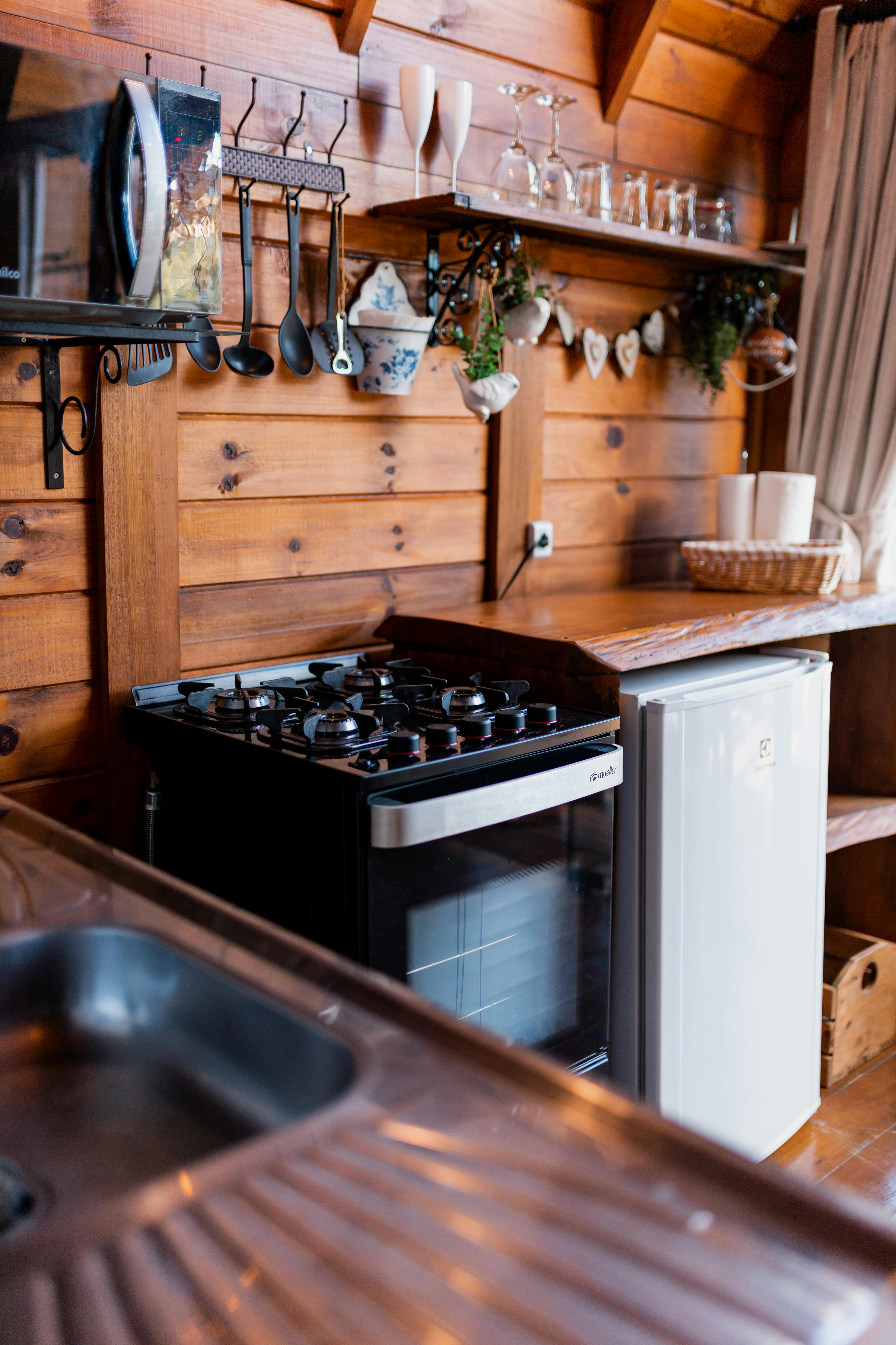 Cozy Rustic Kitchen with Wooden Interior Design · Free Stock Photo