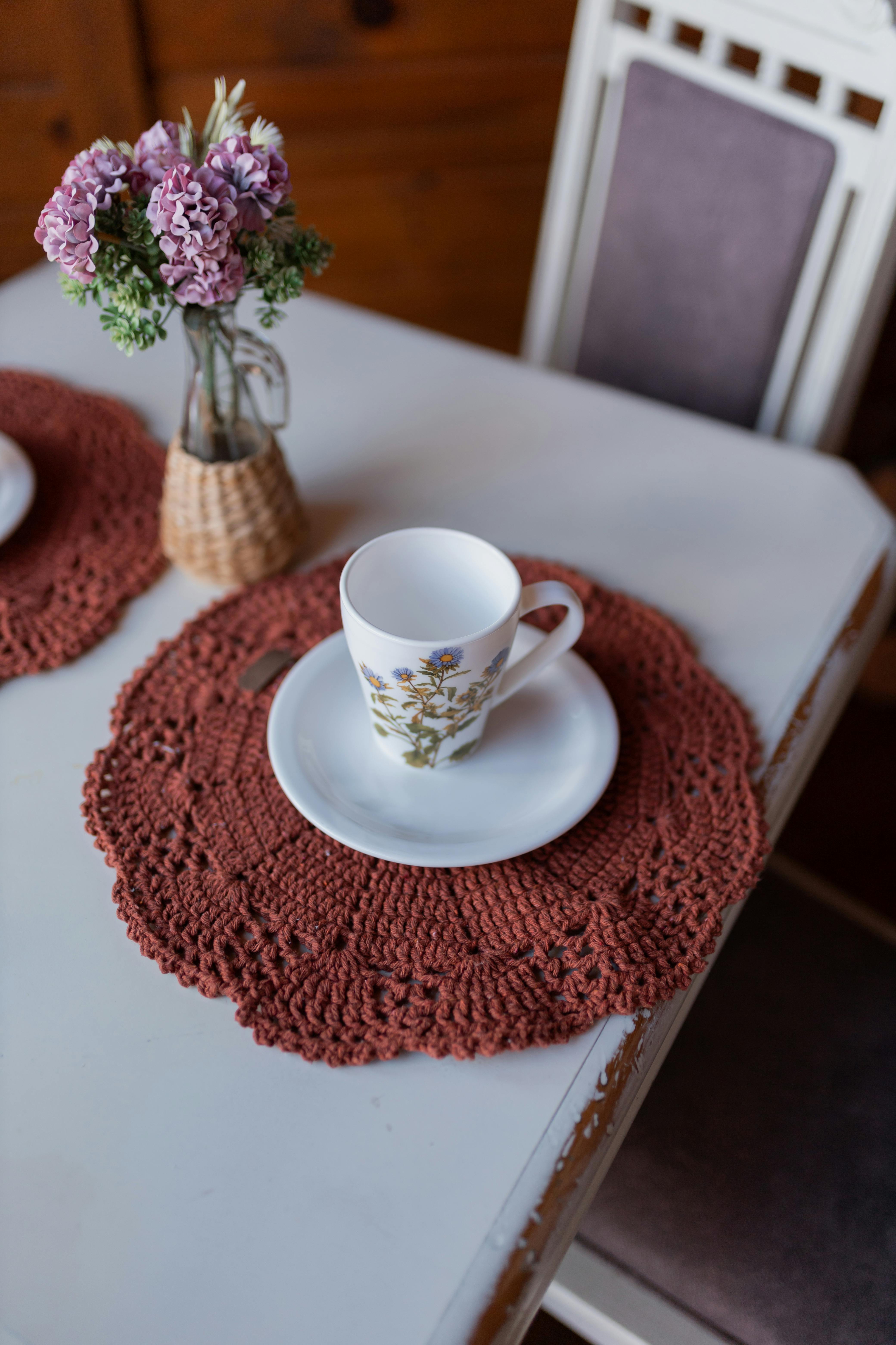 Cozy Table Setting with Floral Cup and Vase · Free Stock Photo