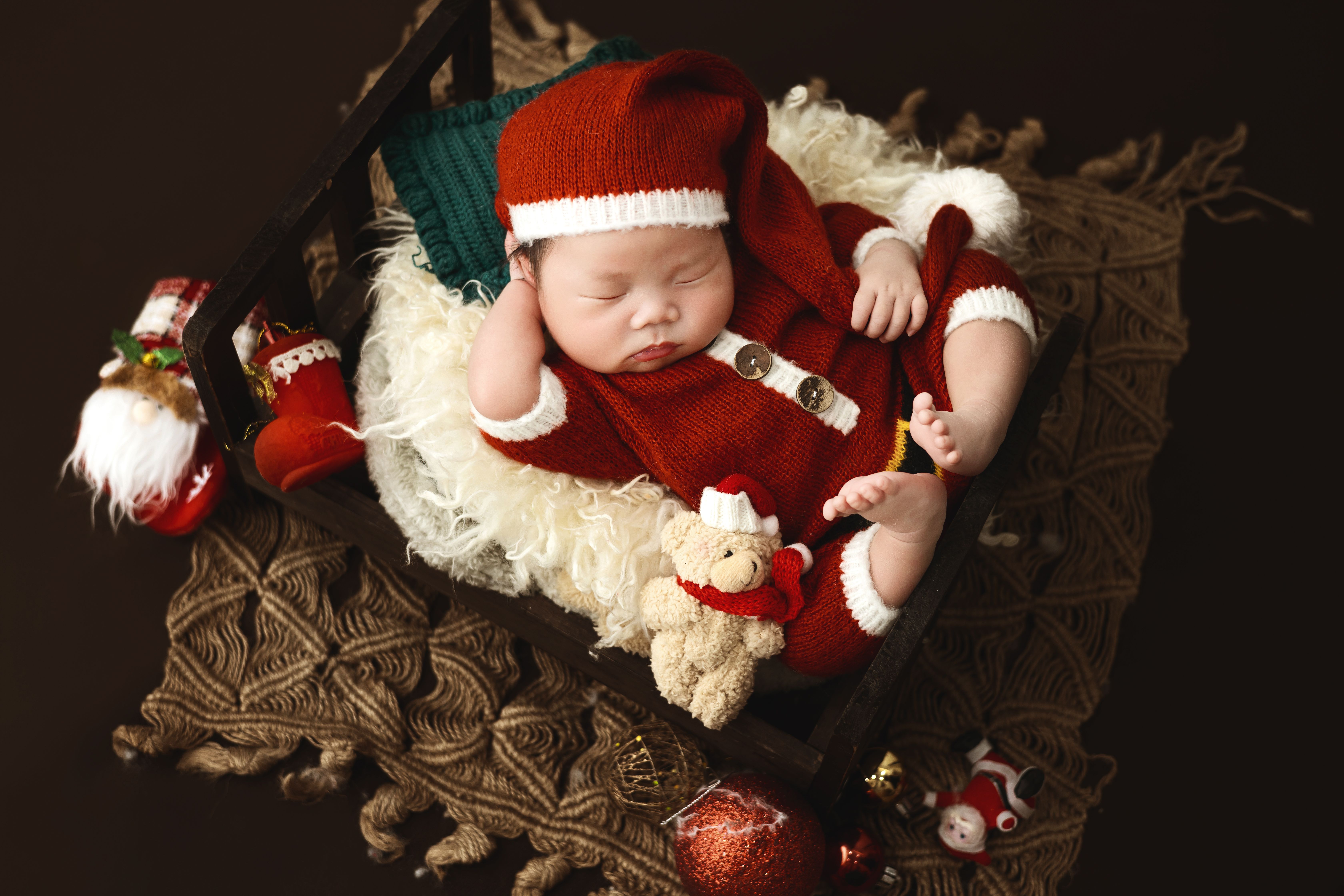 Adorable Baby in Santa Outfit Sleeping Peacefully · Free Stock Photo