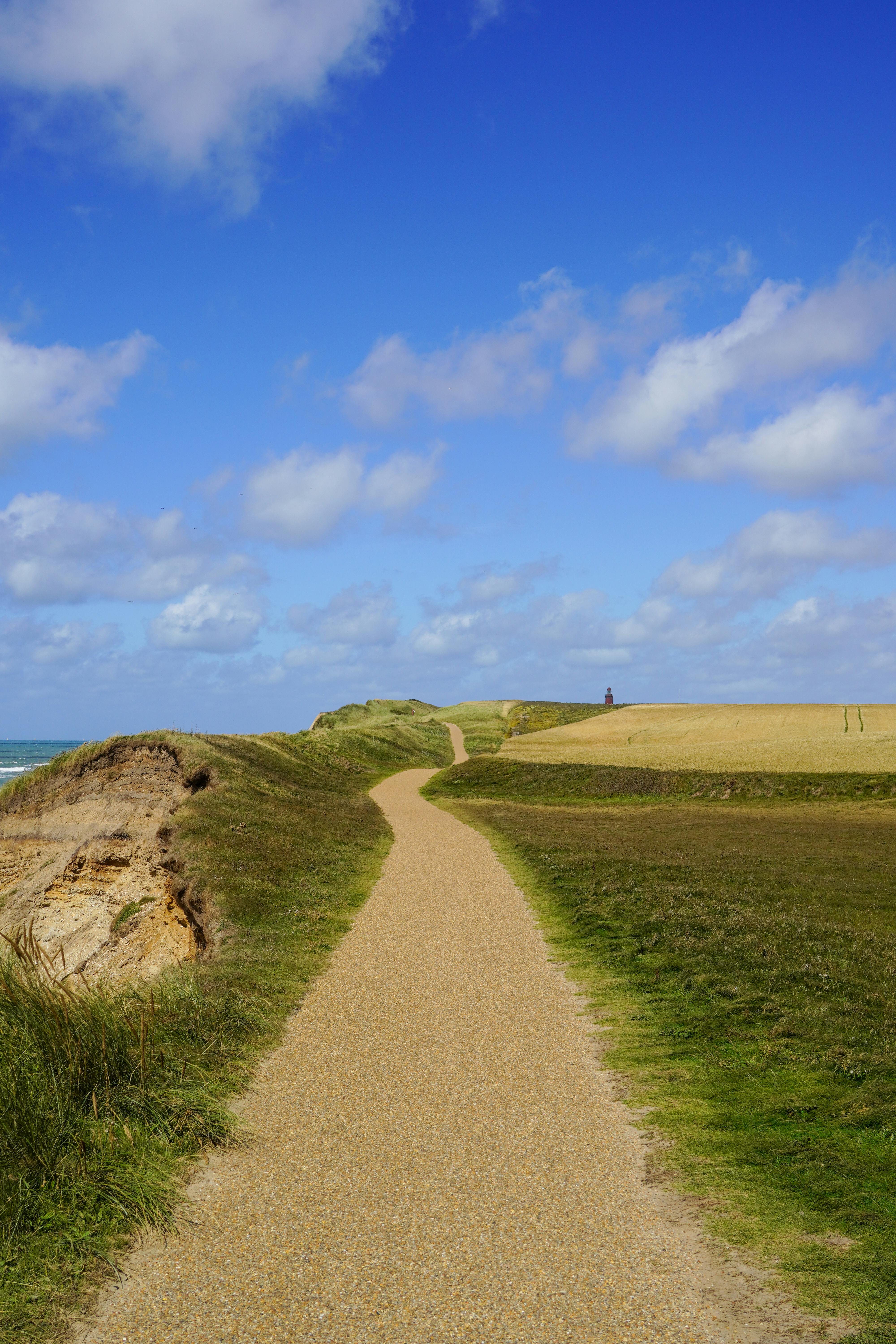 Scenic Pathway in Ferring, Denmark with Blue Skies · Free Stock Photo