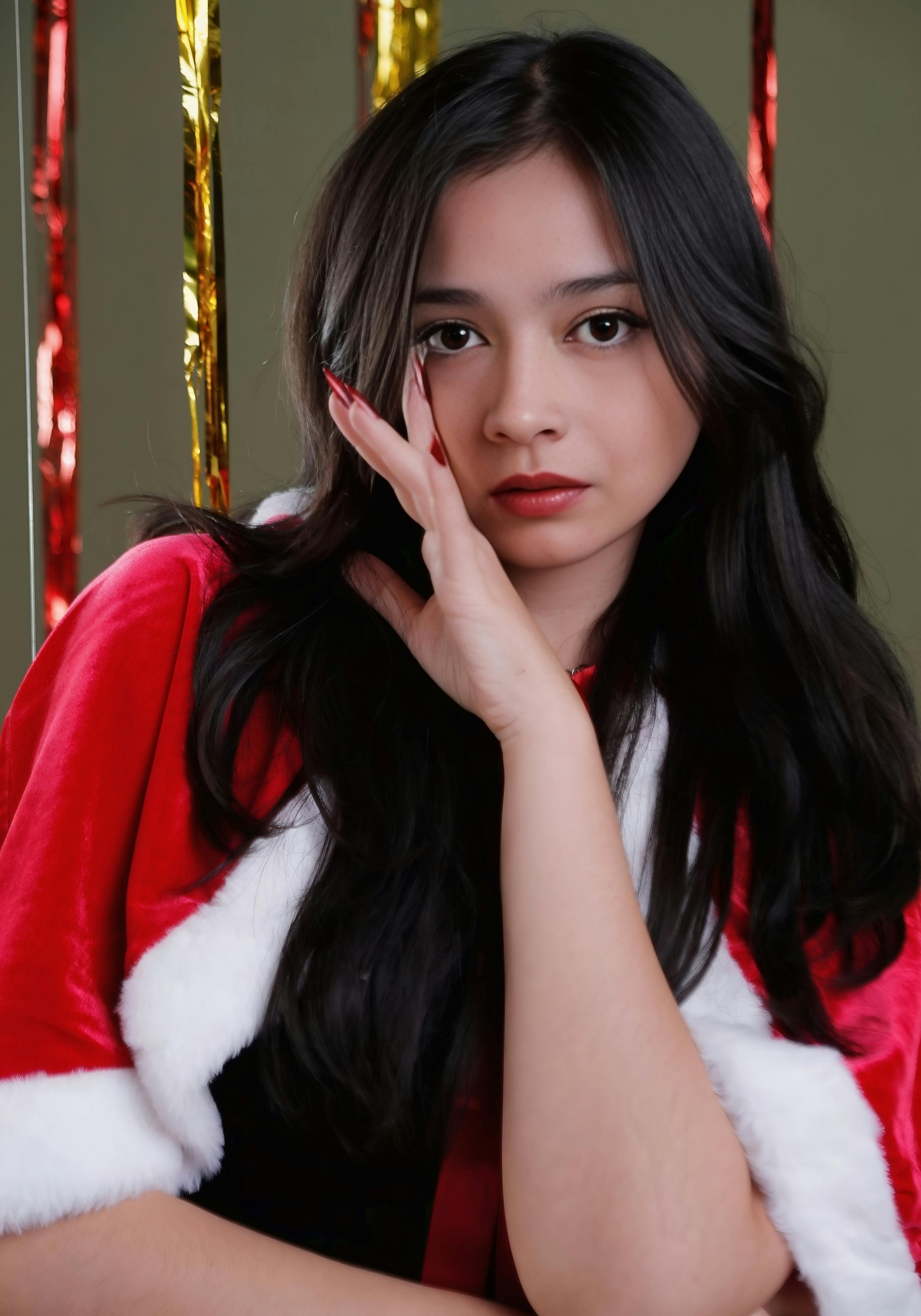 Festive Portrait of Woman in Santa Outfit · Free Stock Photo