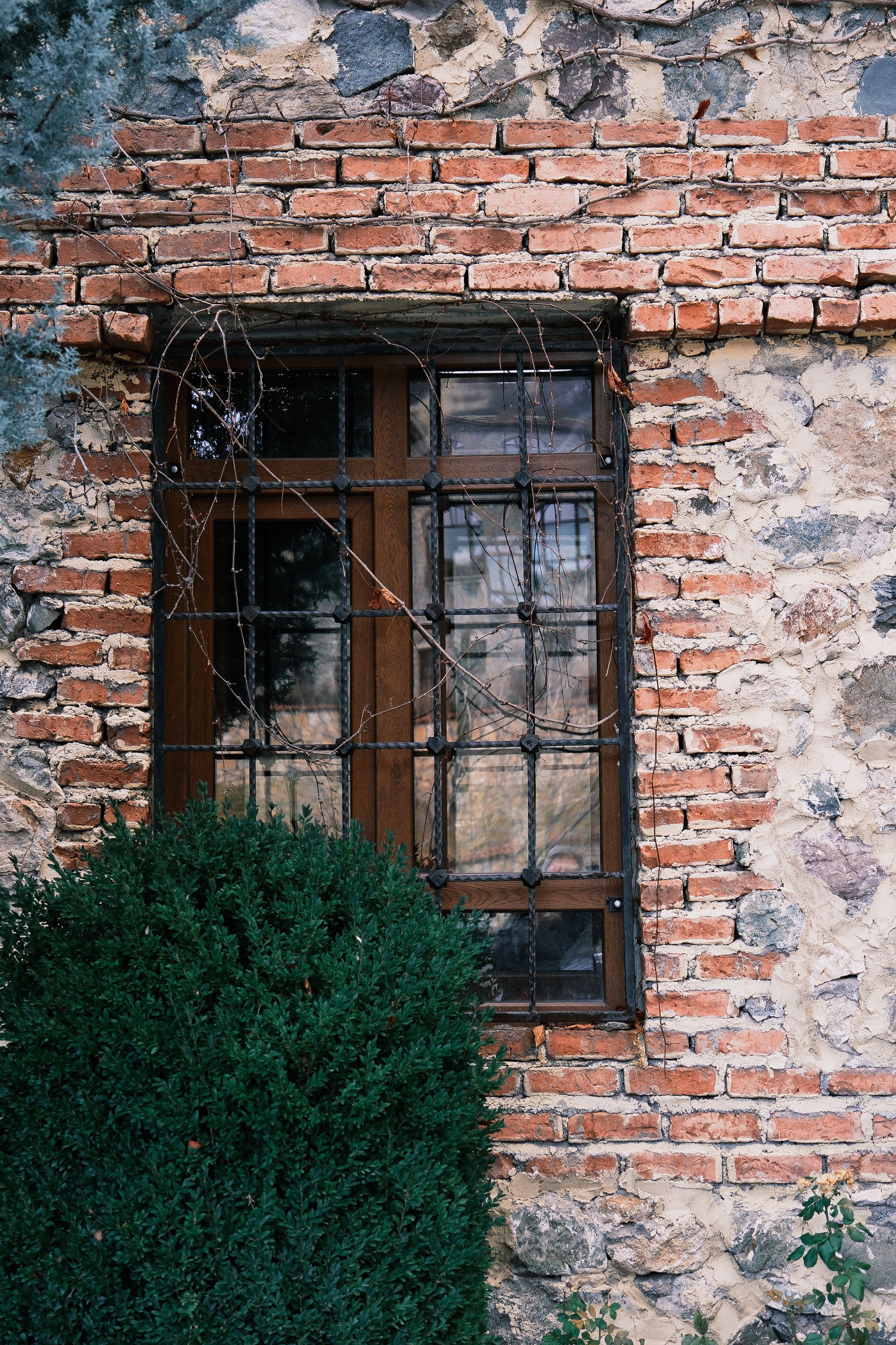 Rustic Brick Wall with Vintage Window · Free Stock Photo