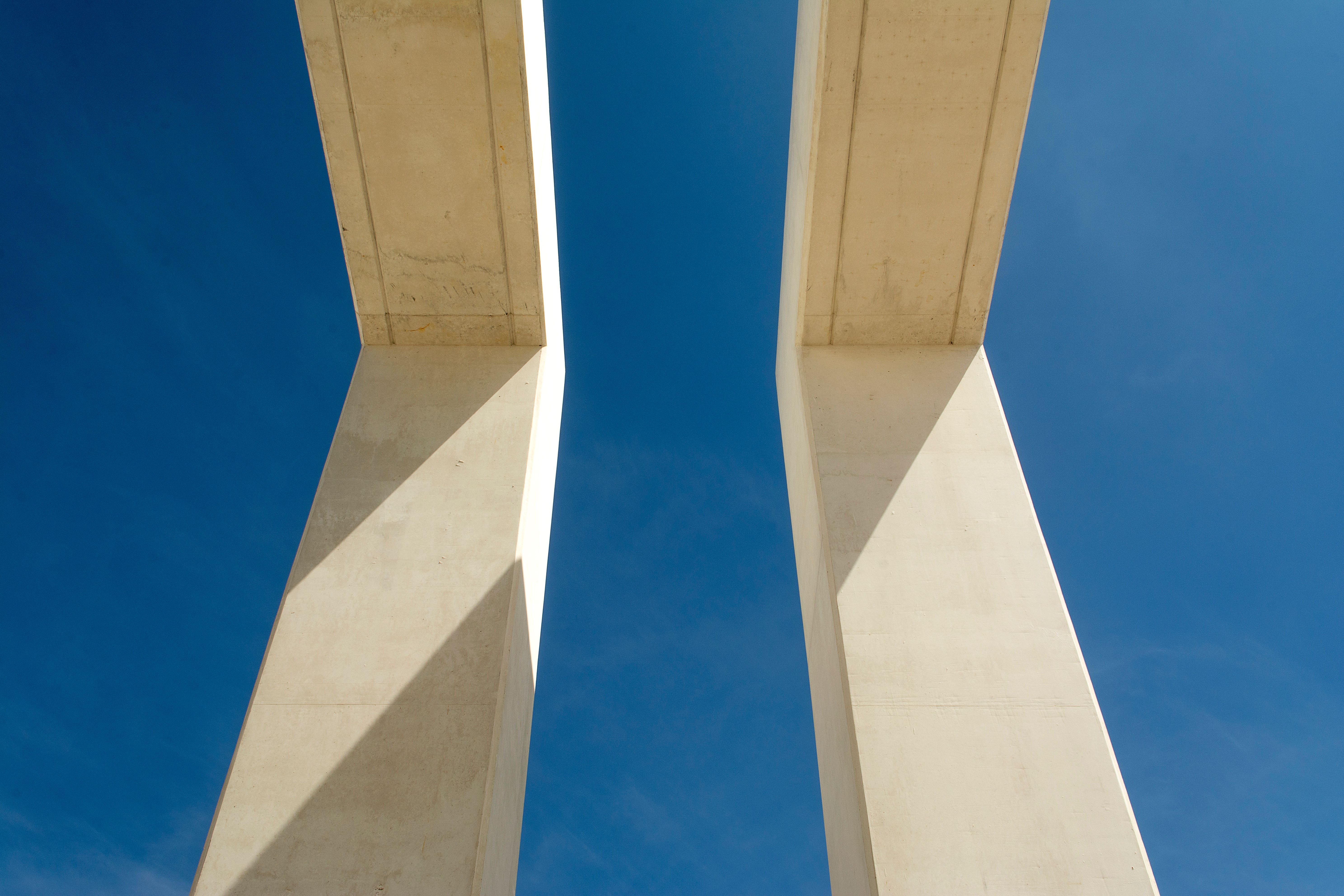 Modern Architectural Concrete Structure Against Sky · Free Stock Photo