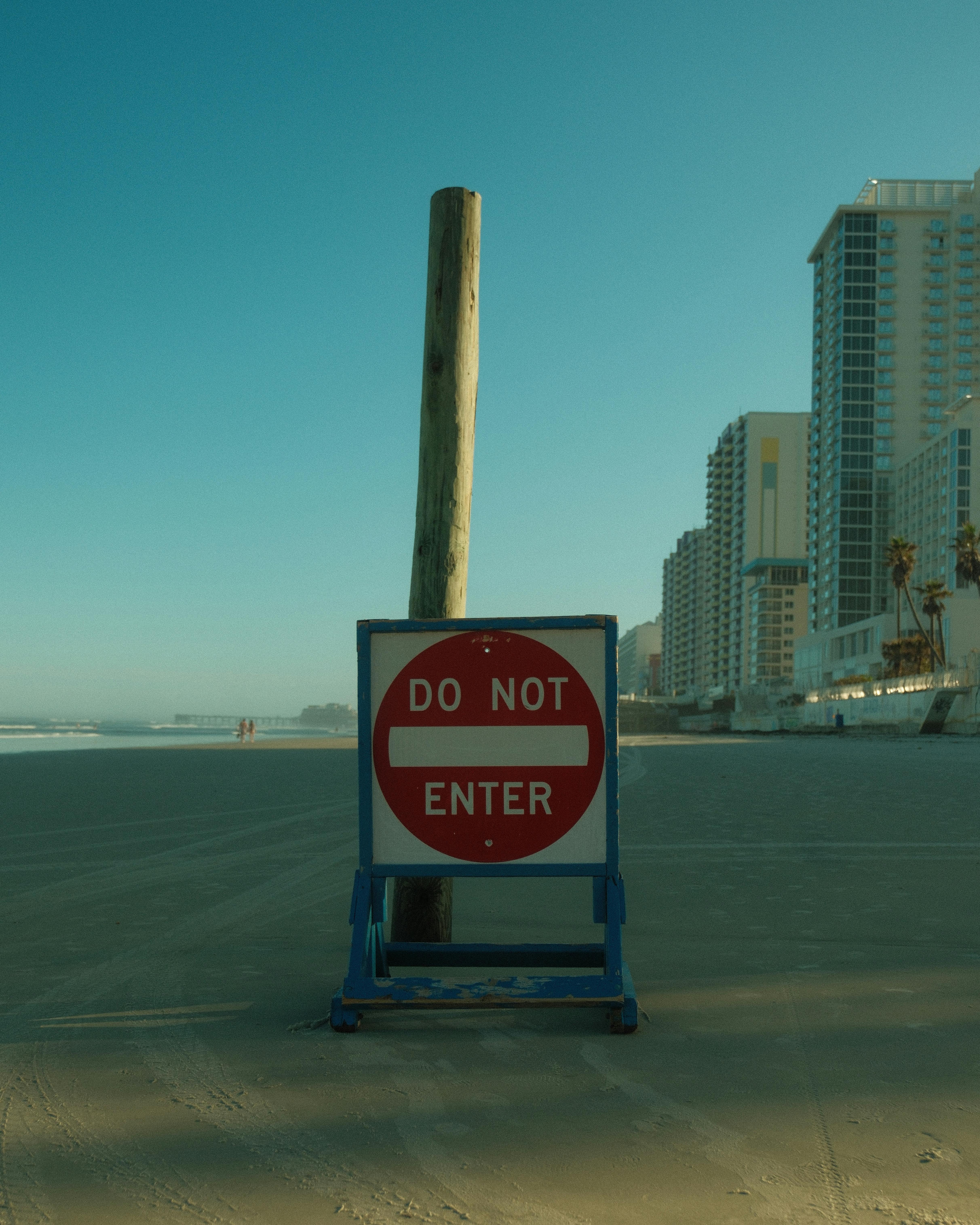 Do Not Enter Sign on Beachfront with Skyline · Free Stock Photo