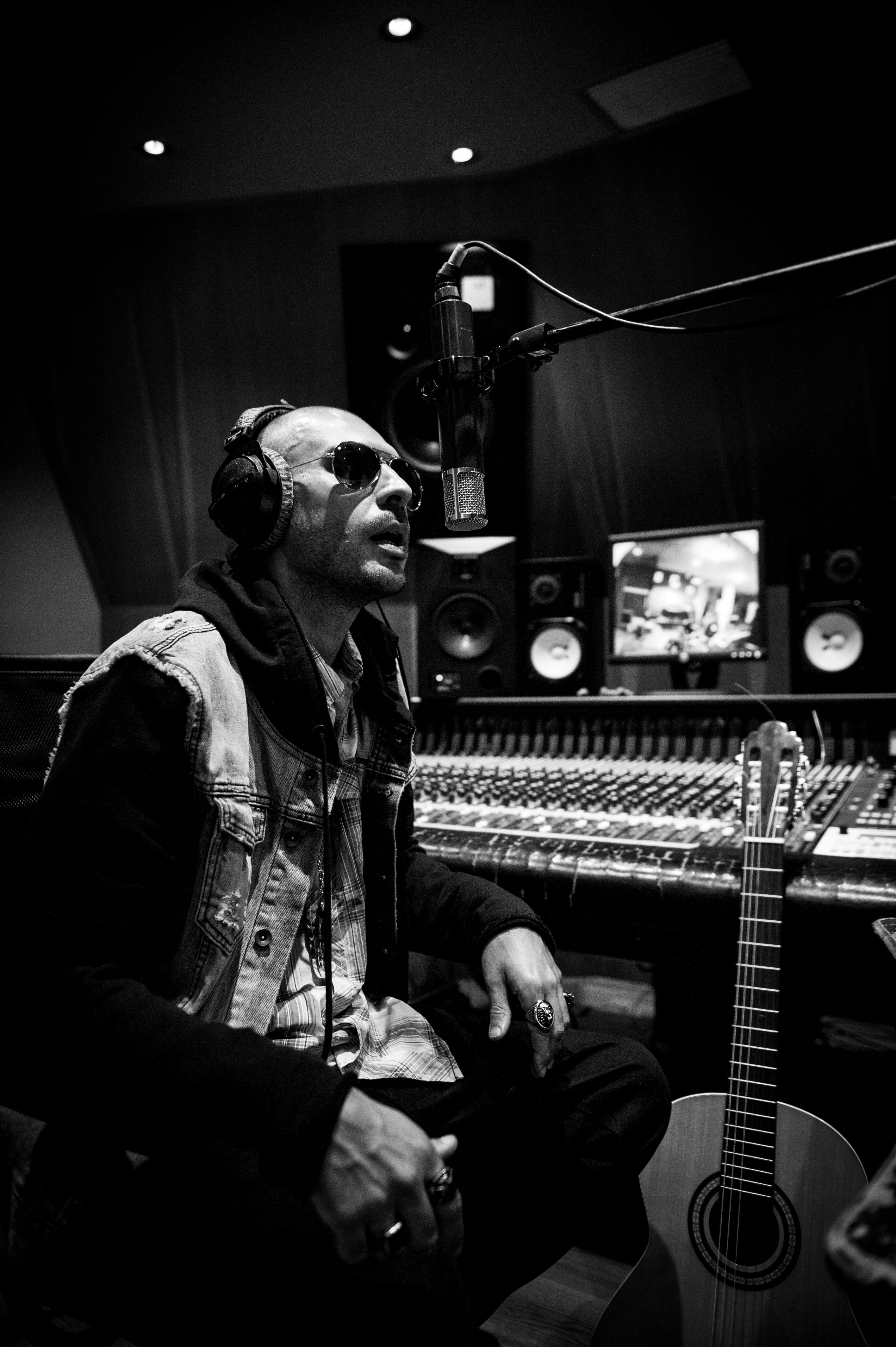 Musician Recording in Professional Studio · Free Stock Photo