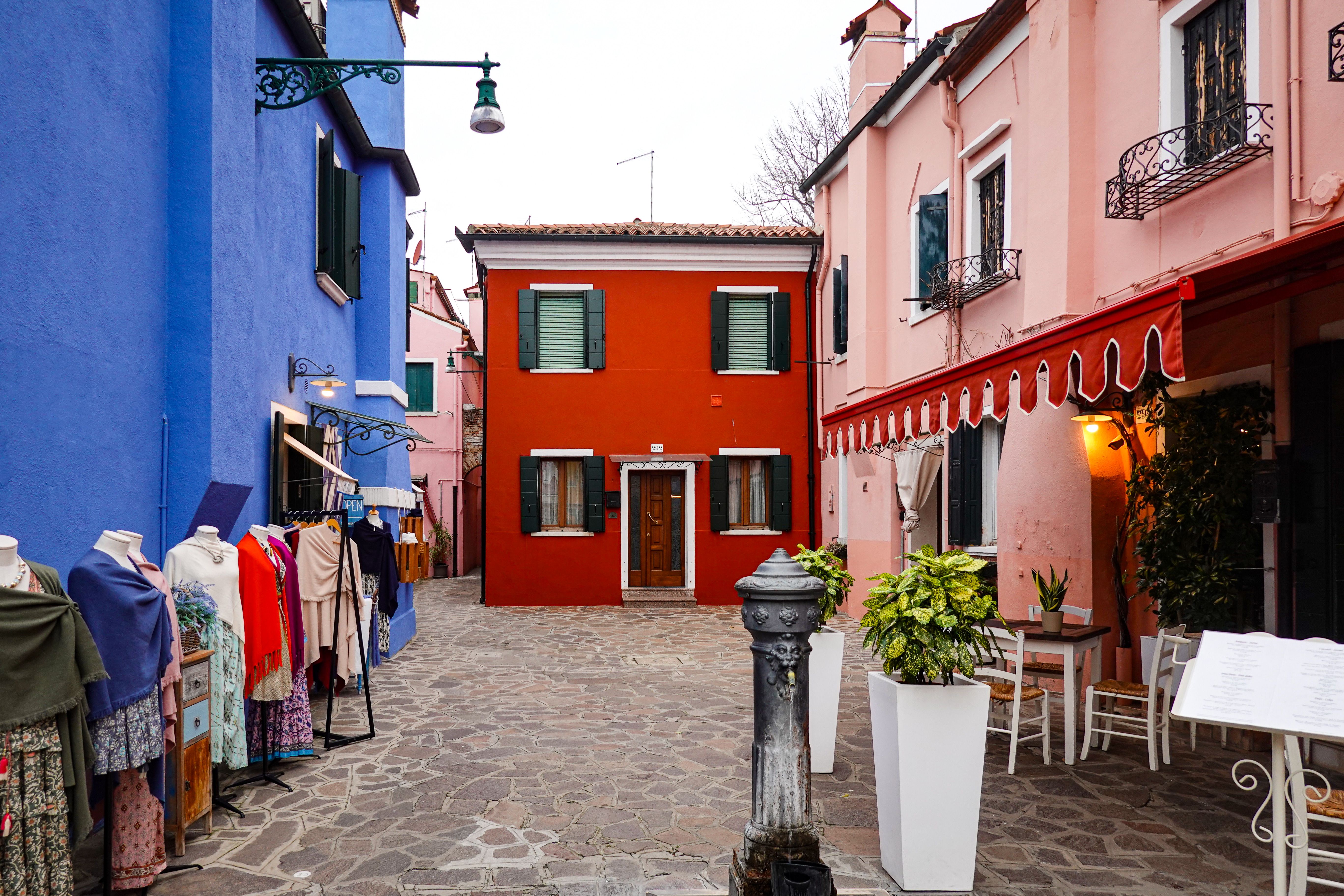 Colorful Street Scene with Vibrant Painted Houses · Free Stock Photo