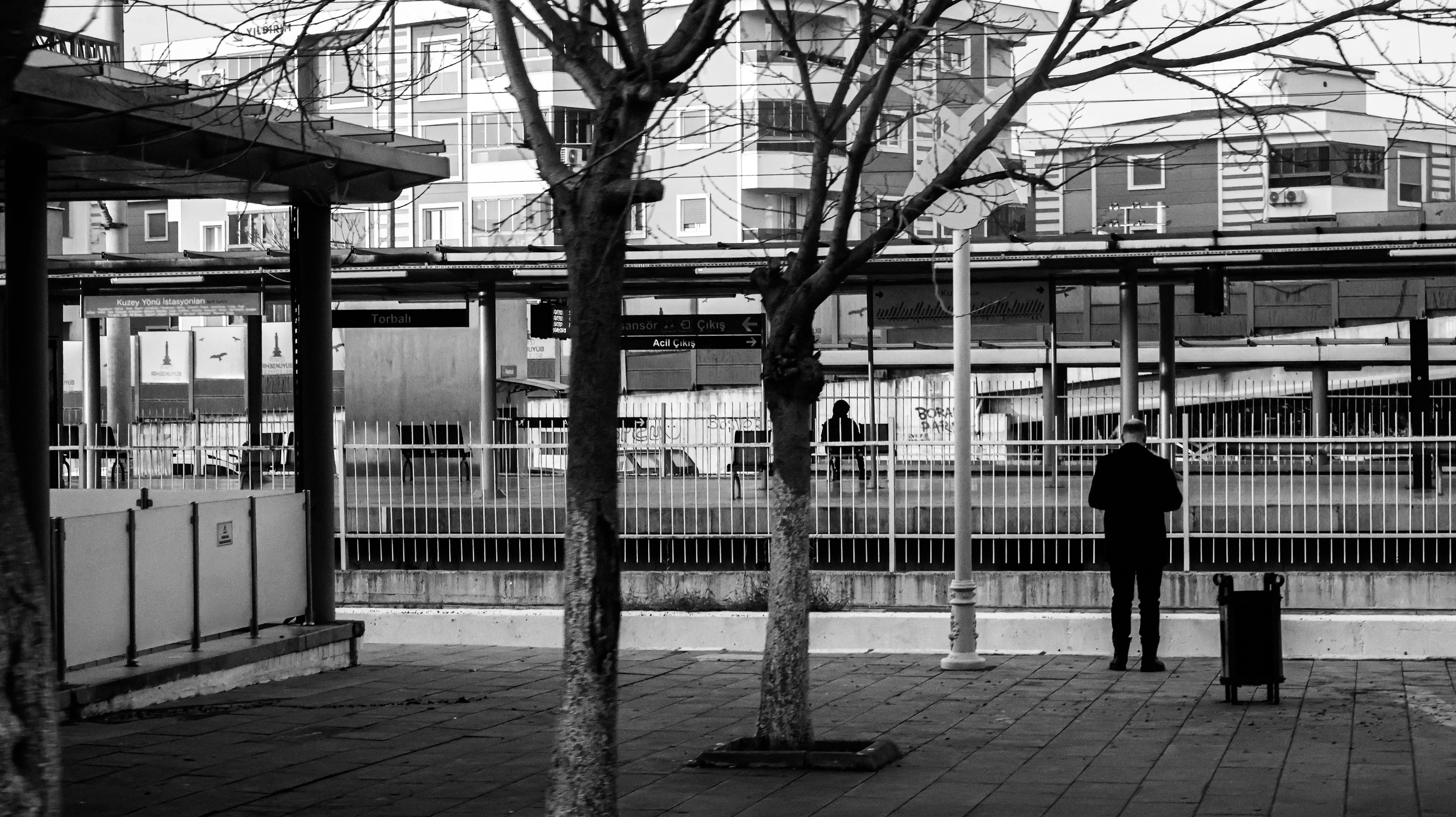 Black and White Urban Train Station Scene · Free Stock Photo