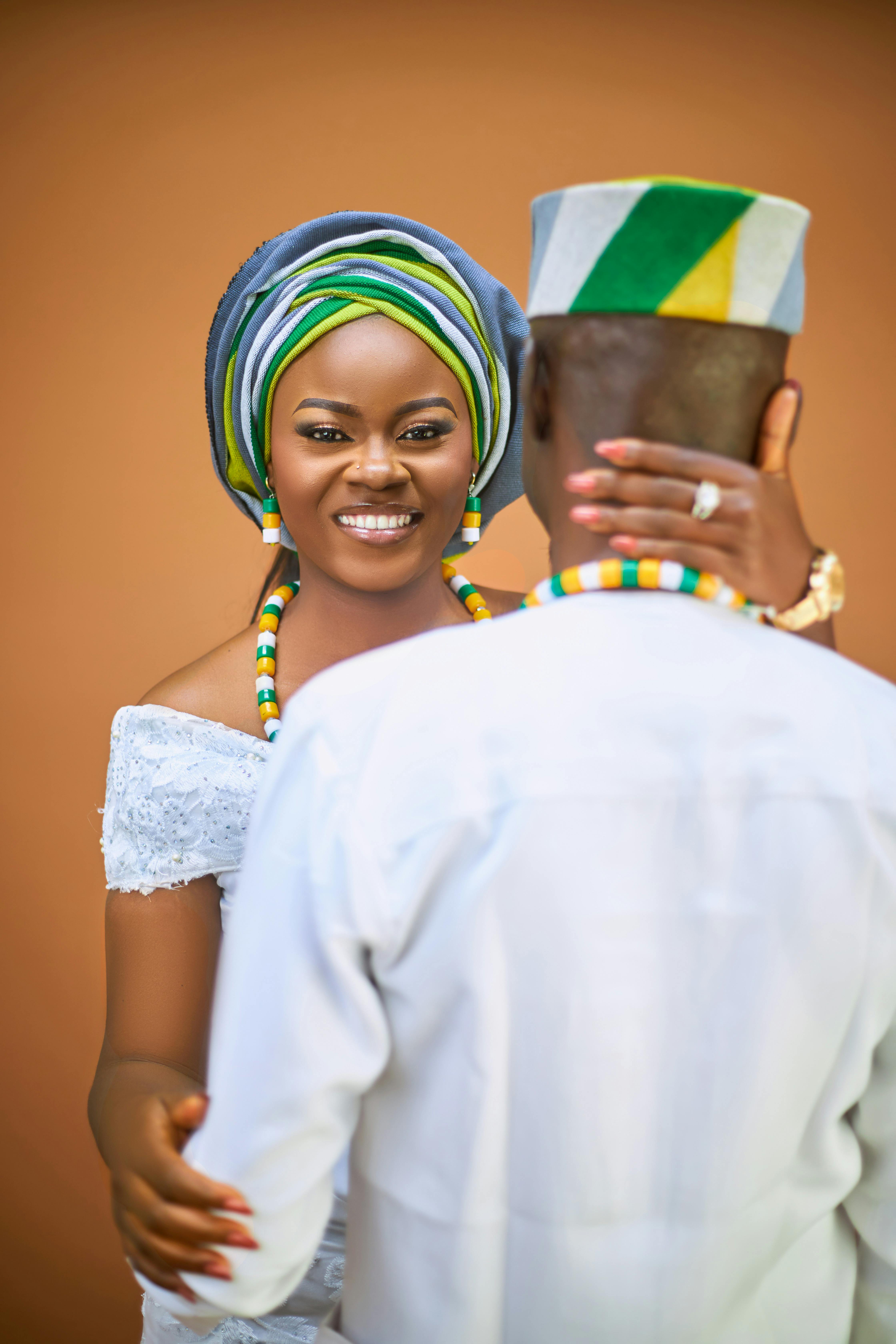 Traditional African Couple Embracing in Colorful Attire · Free Stock Photo