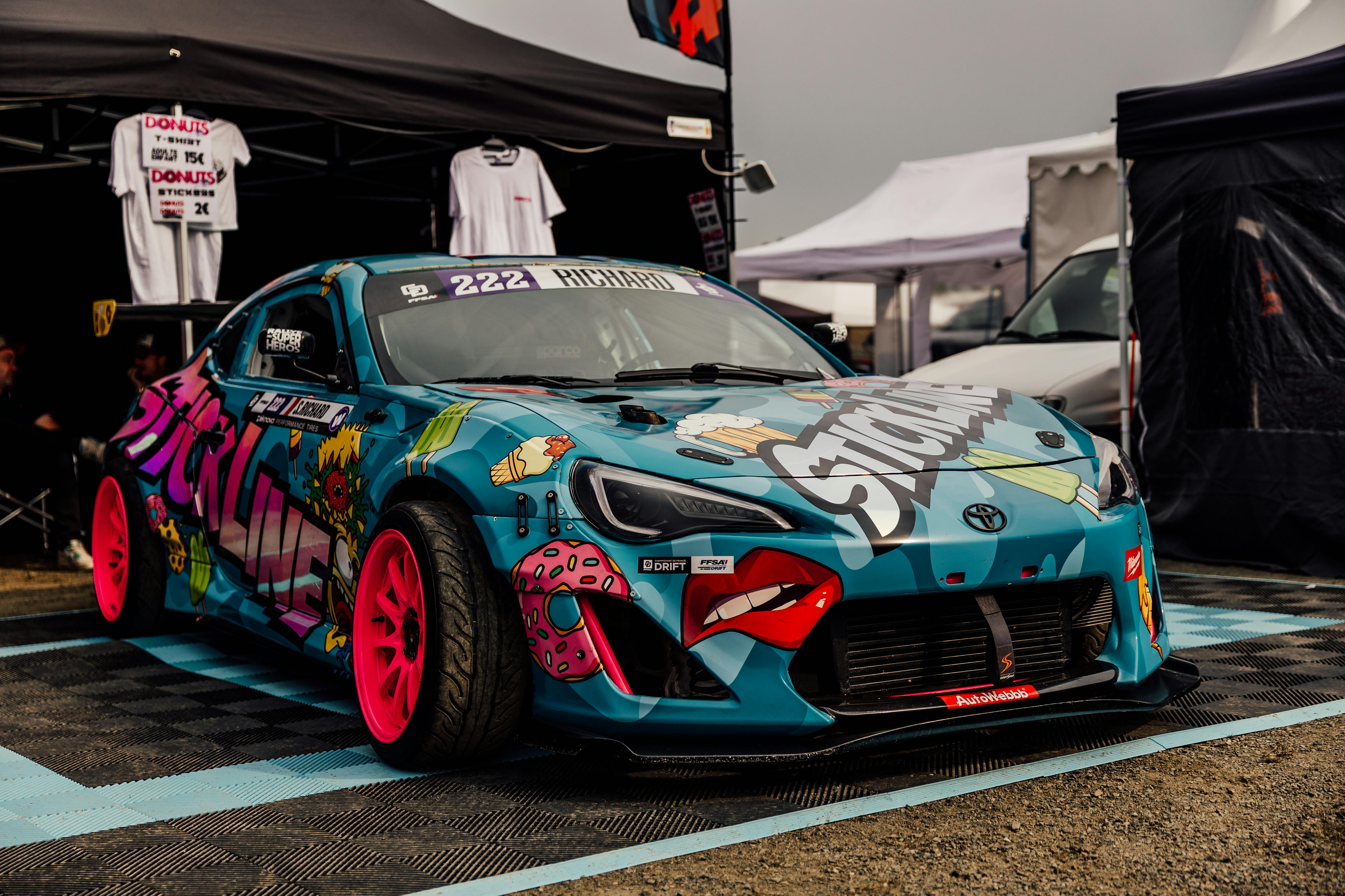 Vibrant Custom Race Car at French Motorsport Event · Free Stock Photo