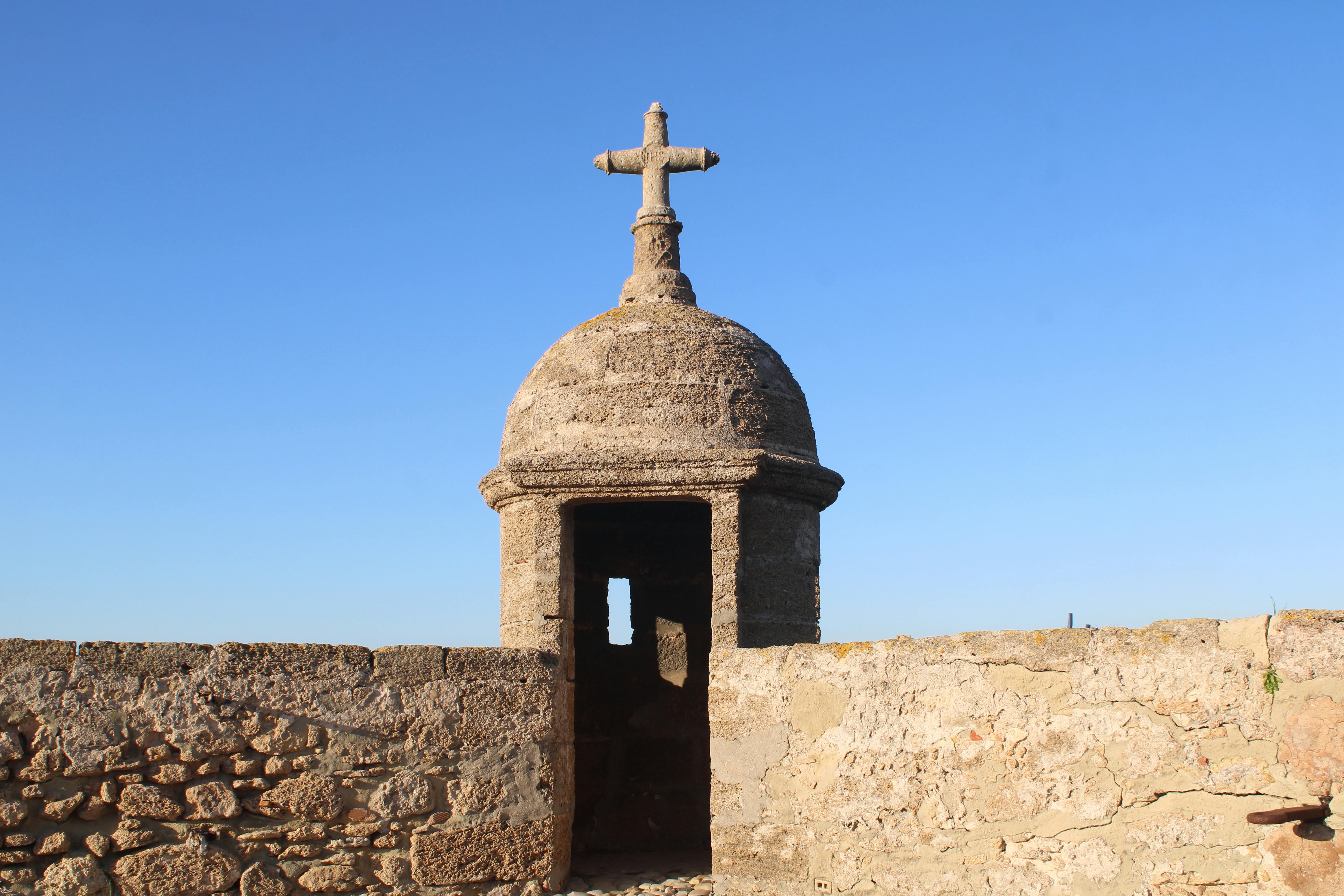 Historic Cádiz Fortification with Stone Cross · Free Stock Photo