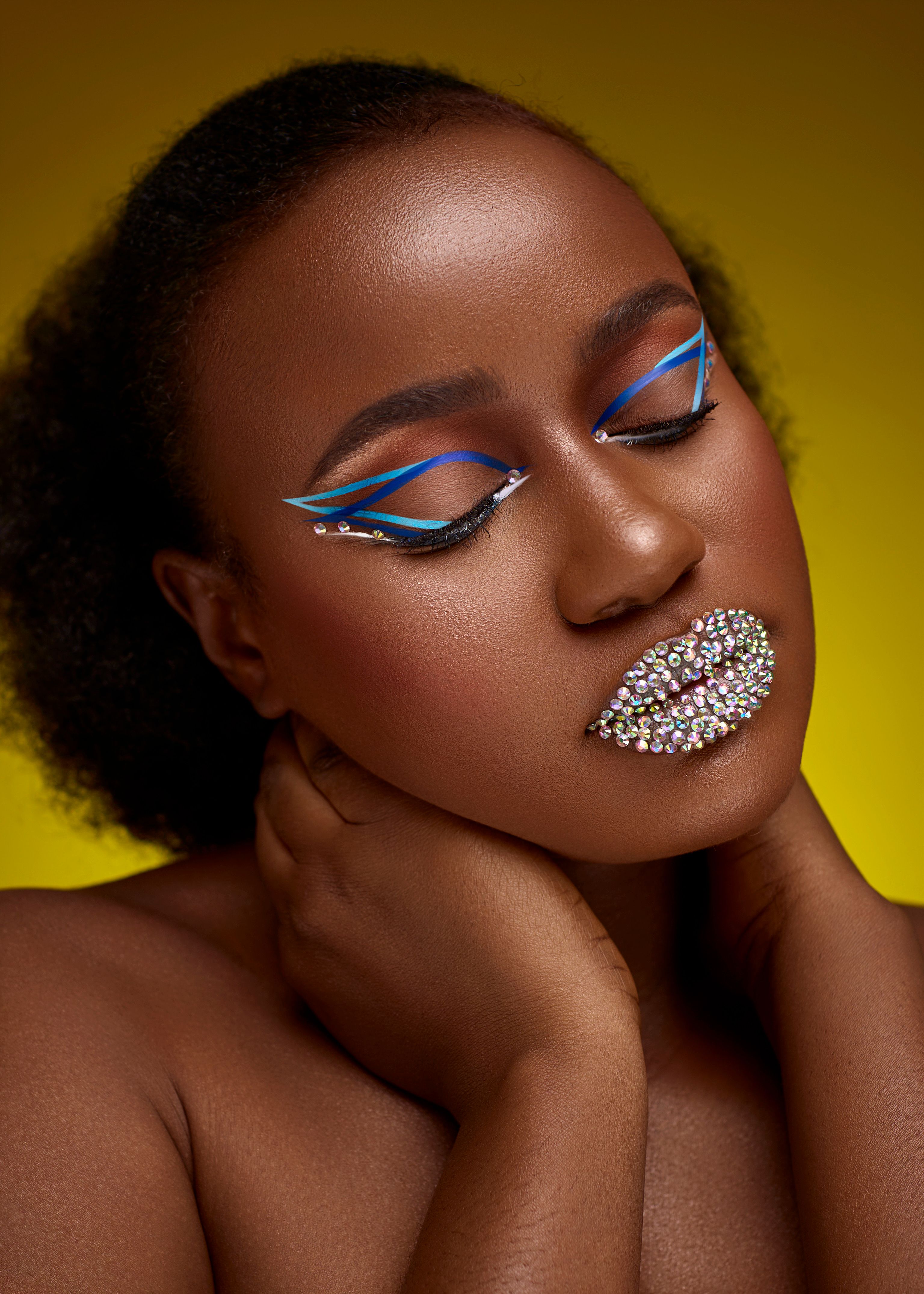 Vibrant Artistic Makeup Portrait with Bold Details · Free Stock Photo