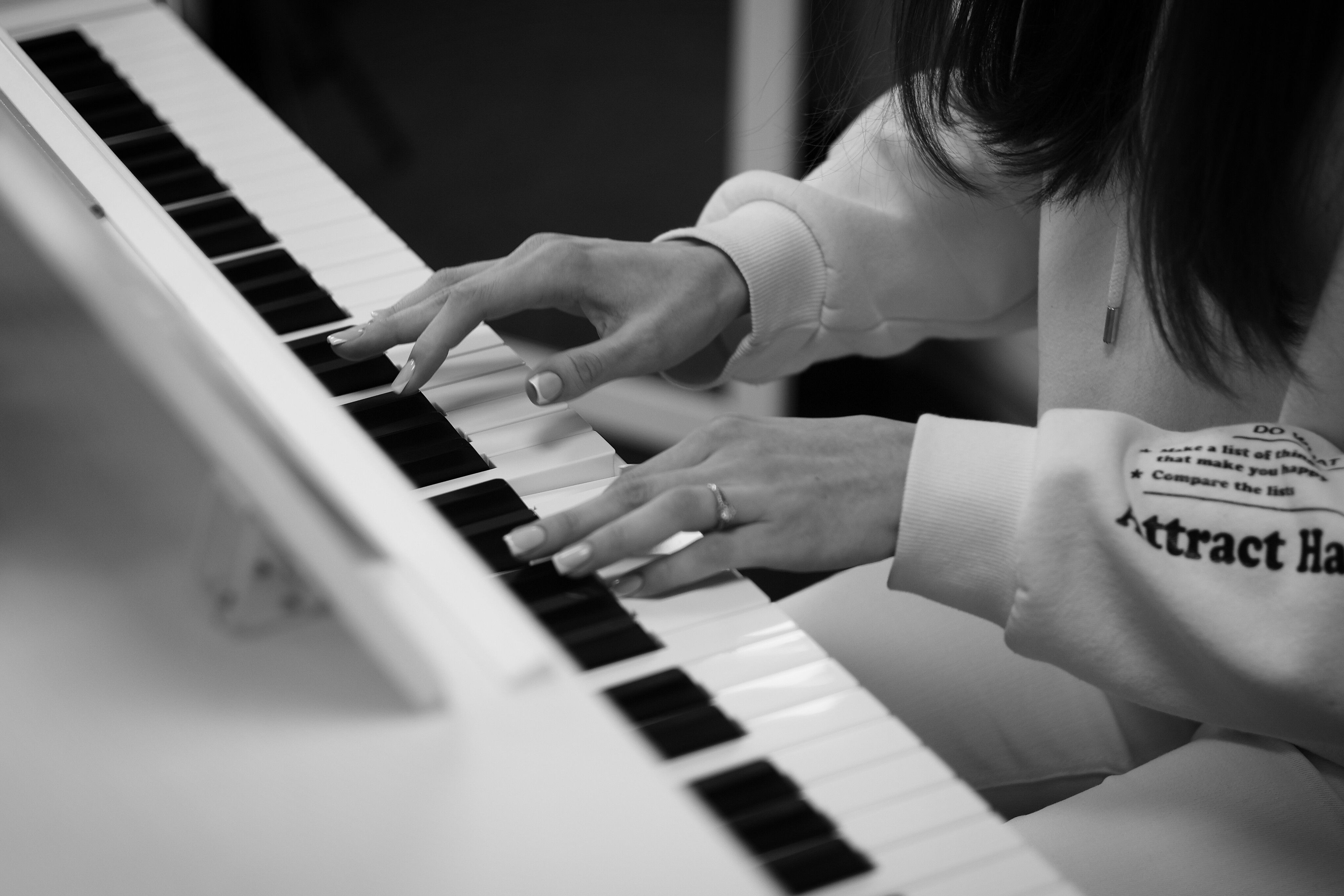 Close-up of hands playing piano keys · Free Stock Photo