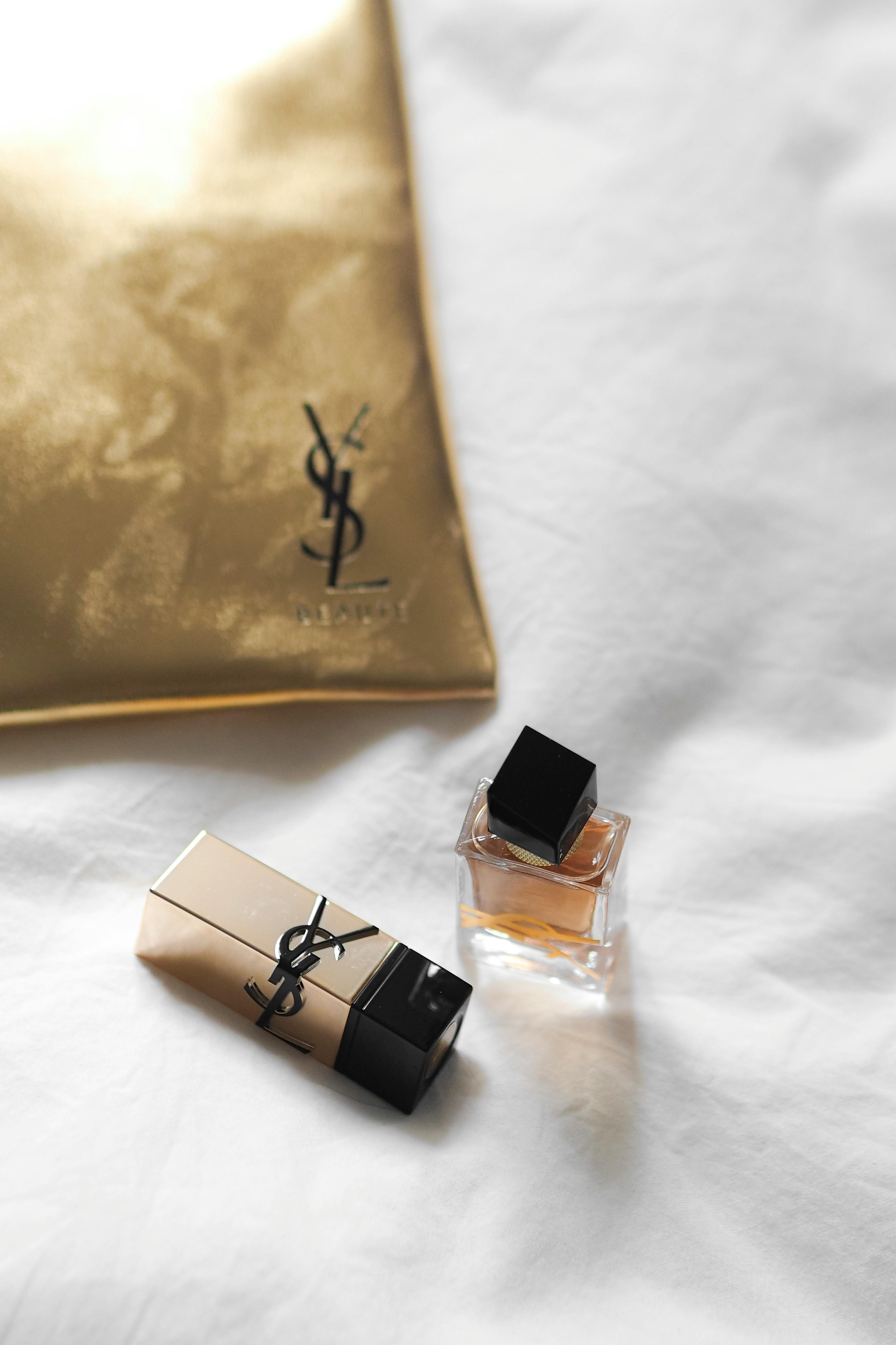 YSL Elegance: Chic Beauty Products on Display · Free Stock Photo