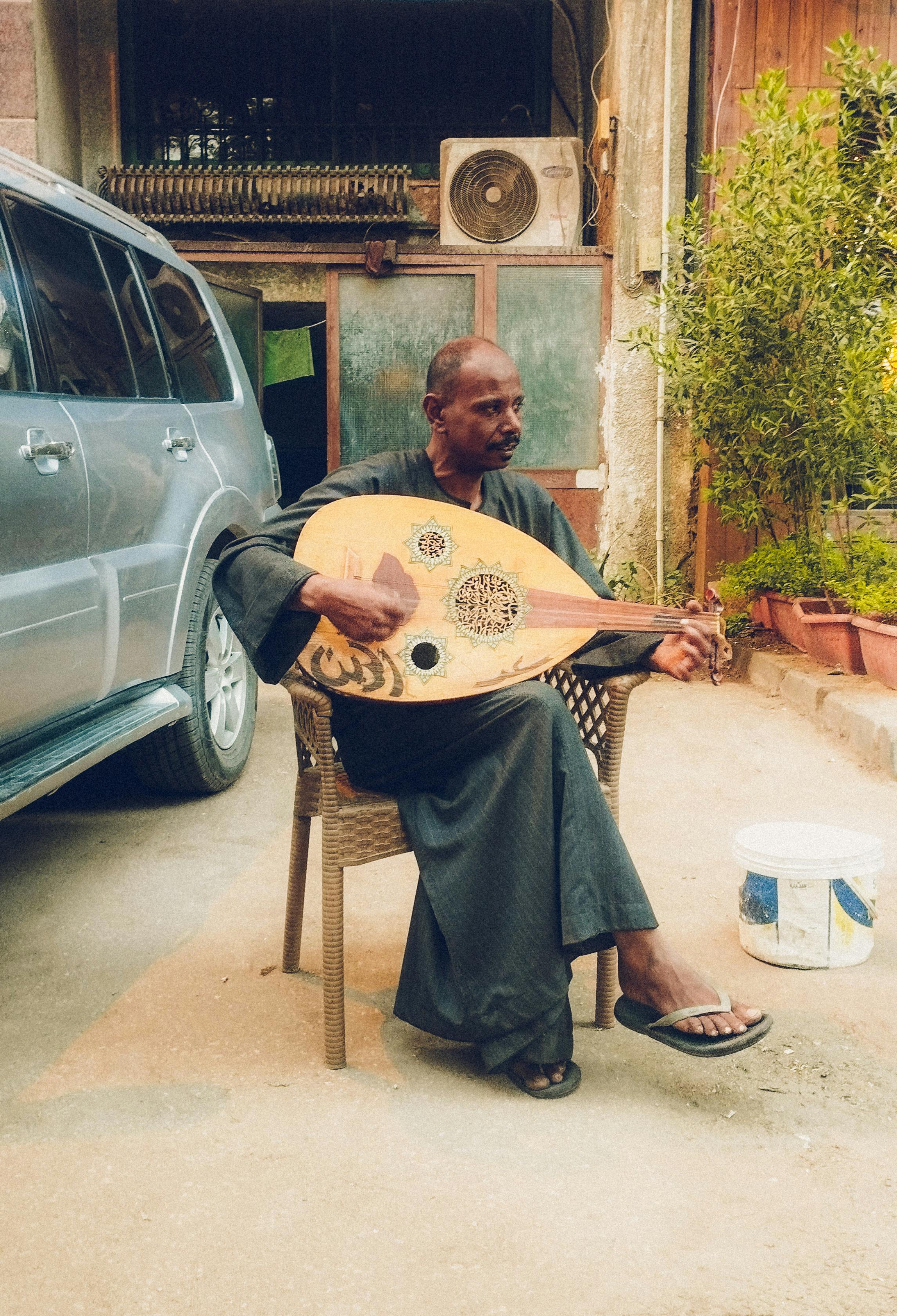 Artistic Portrait of Musician Playing Oud in Egypt · Free Stock Photo