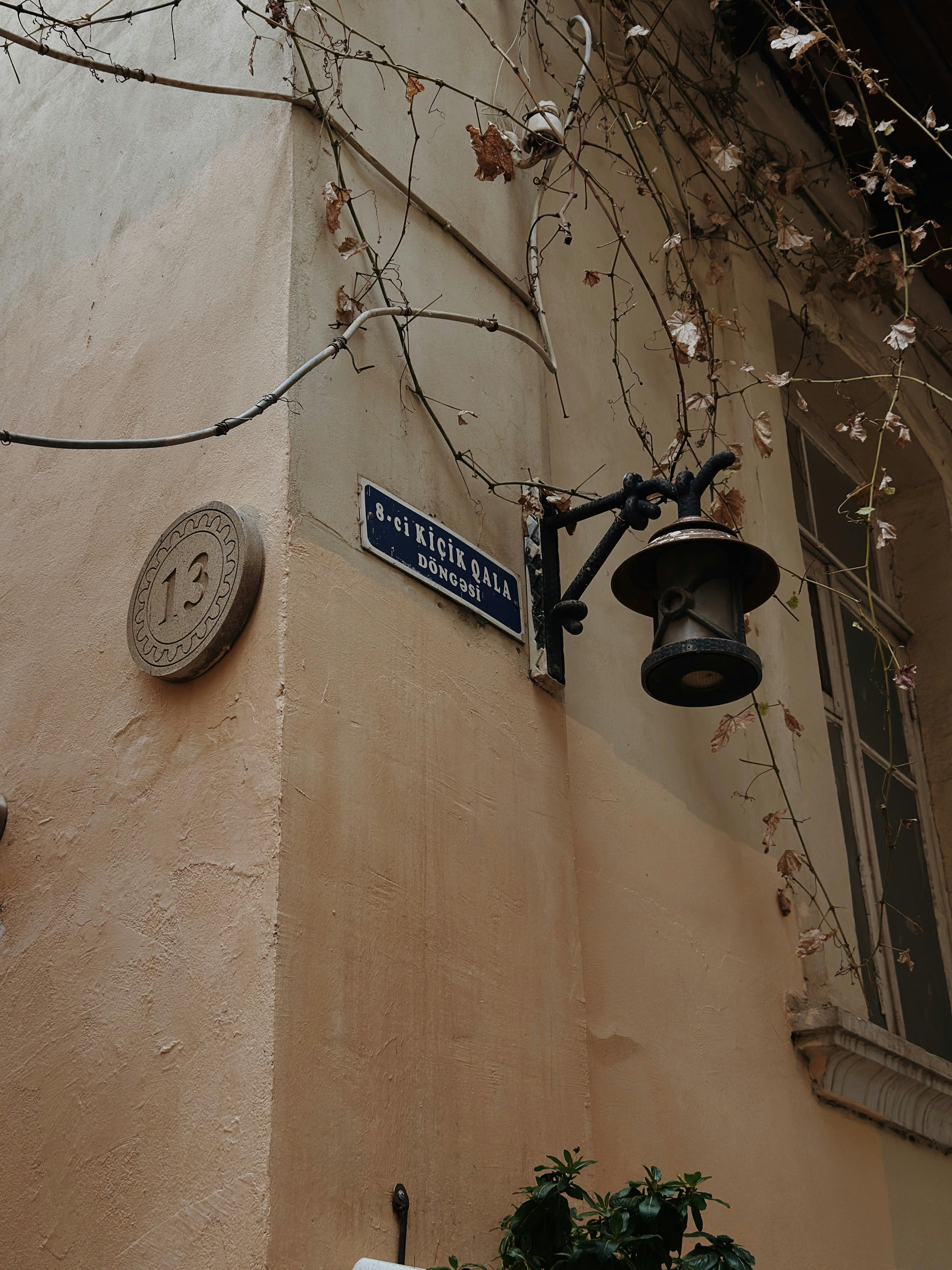 Historic Street Corner with Lamp and Signage · Free Stock Photo