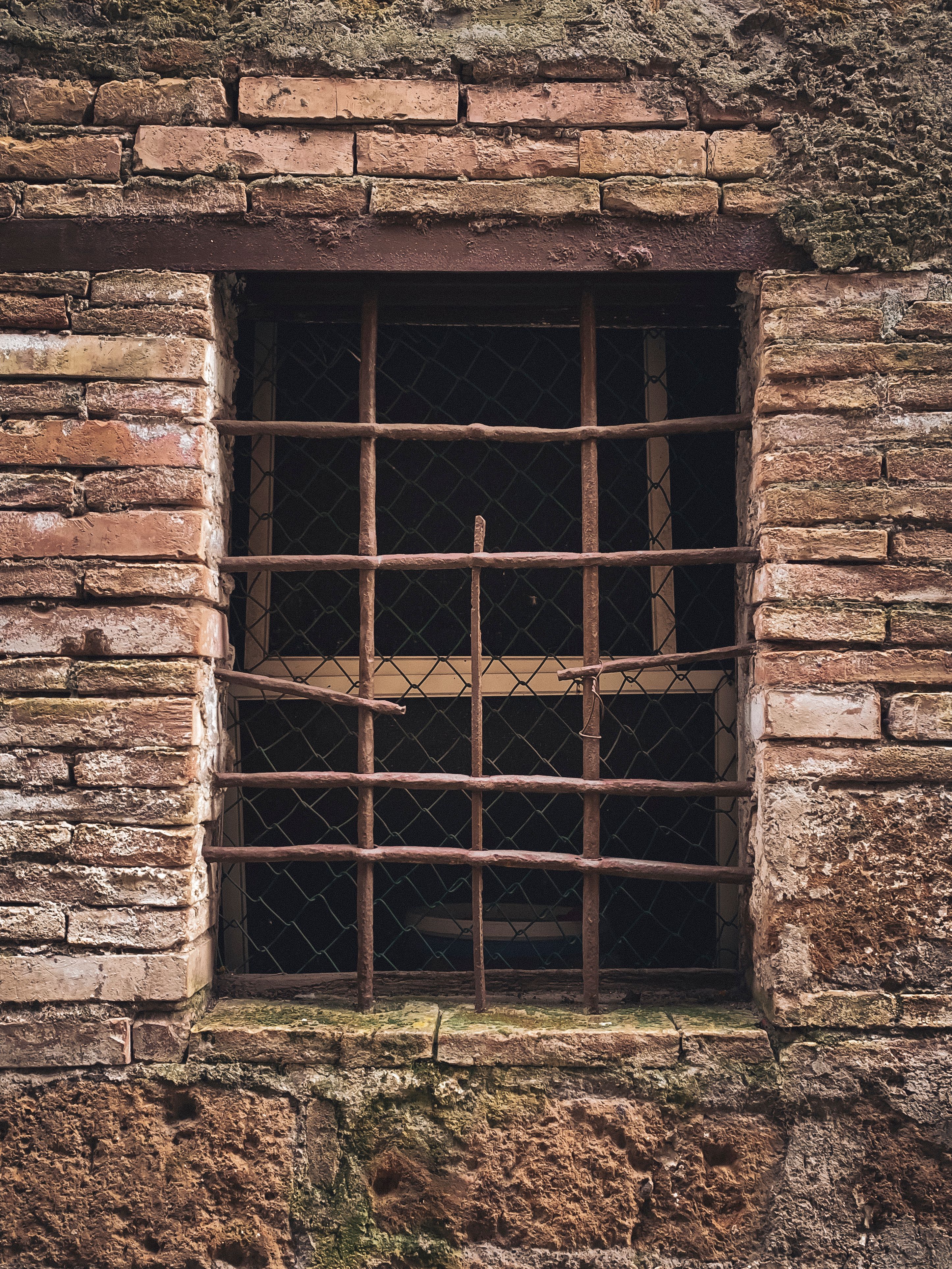 Historic Brick Window with Iron Bars in Italy · Free Stock Photo