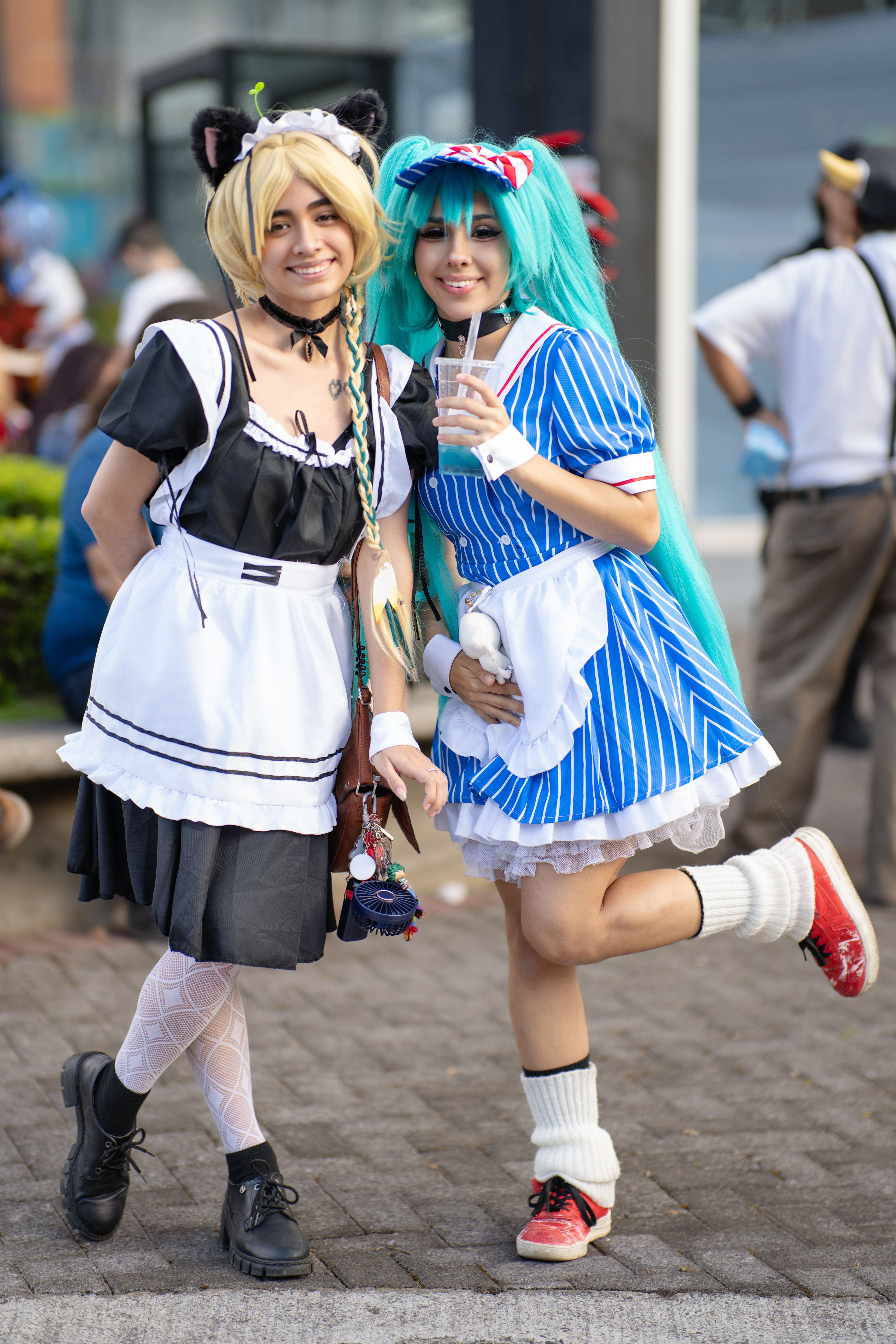 Anime Cosplay Enthusiasts at Outdoor Convention · Free Stock Photo