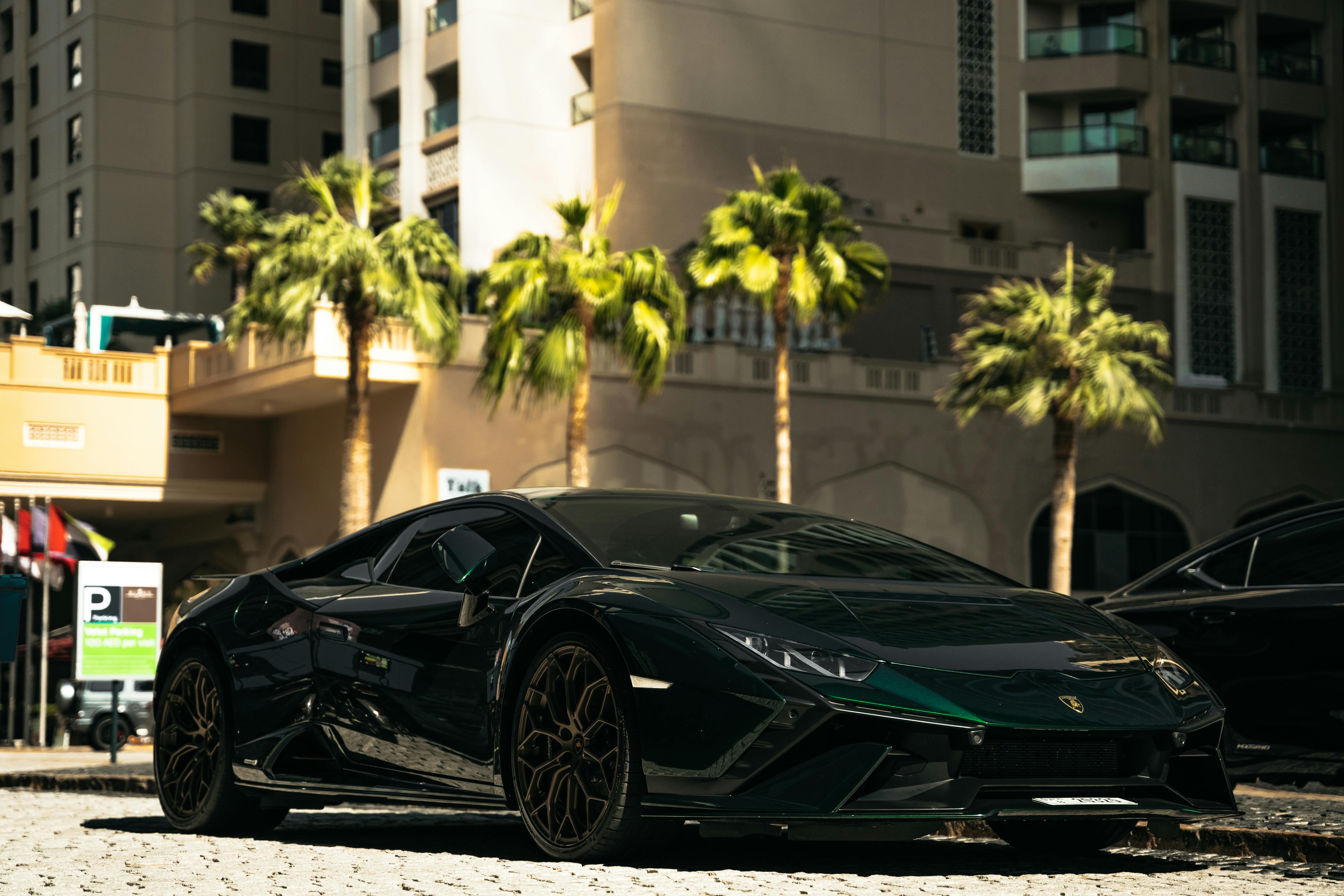 Luxury Sports Car Parked in Dubai Urban Setting · Free Stock Photo