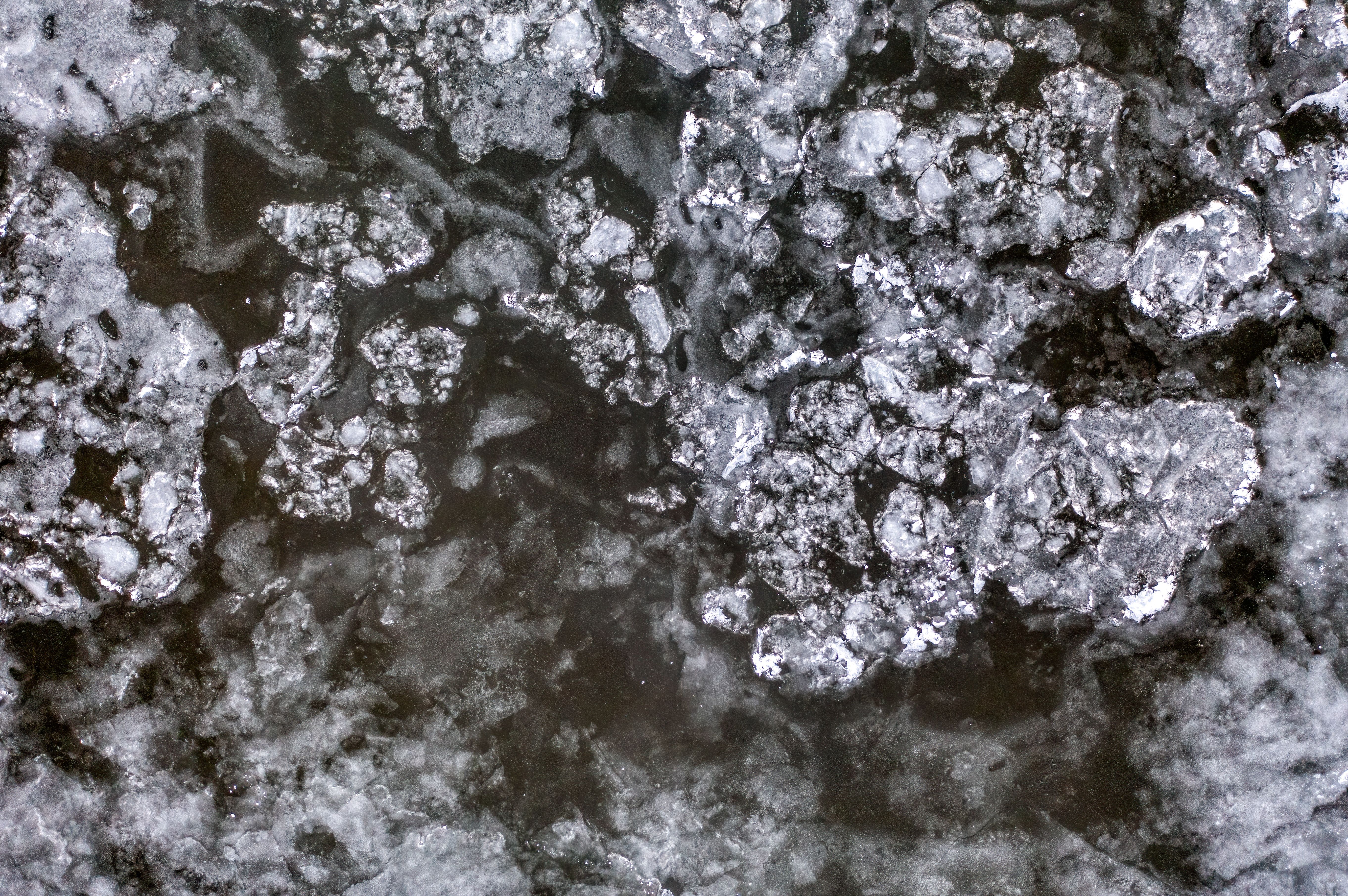 Aerial View of Frozen River Surface in Winter · Free Stock Photo