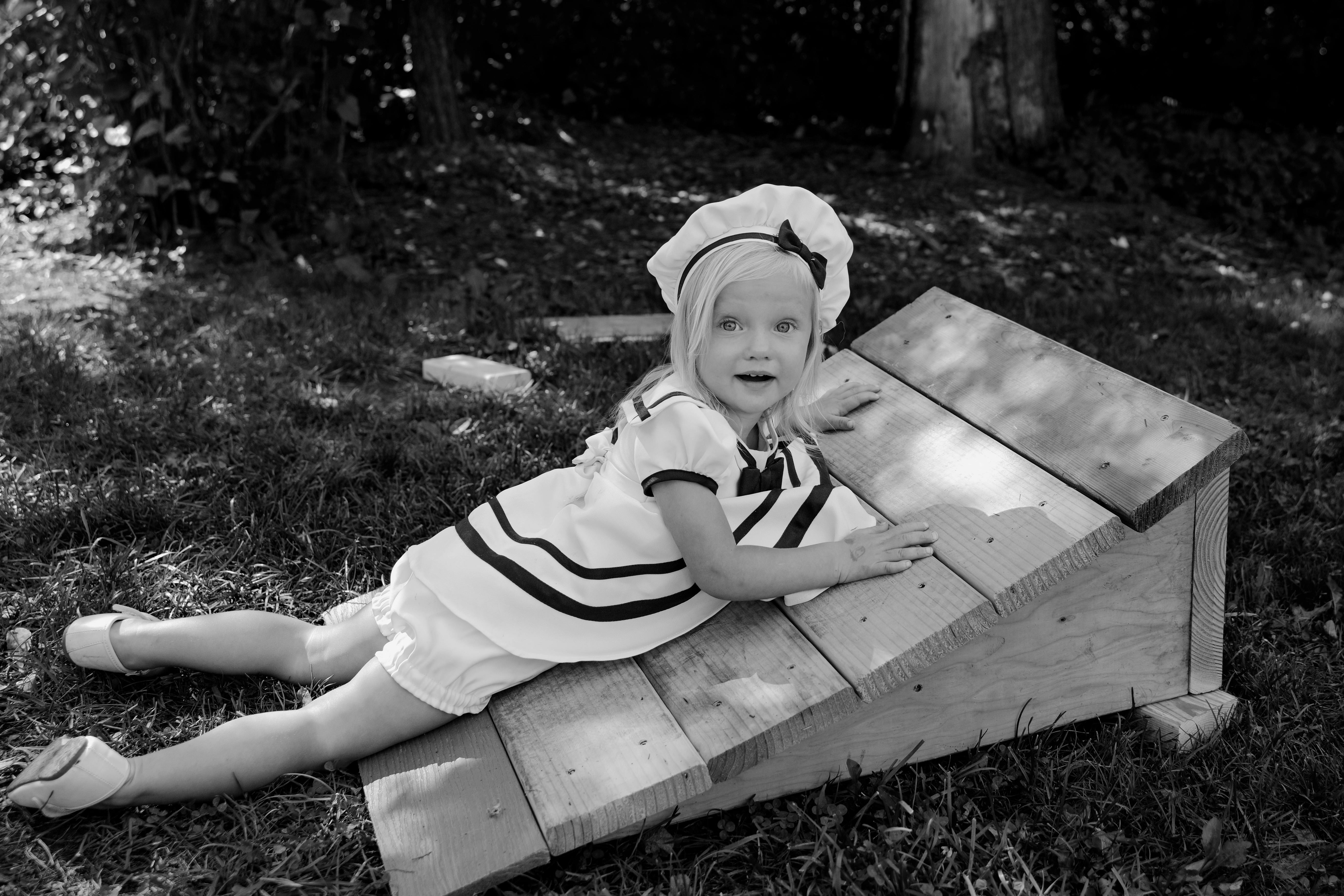 Child in Sailor Outfit Playing Outdoors · Free Stock Photo