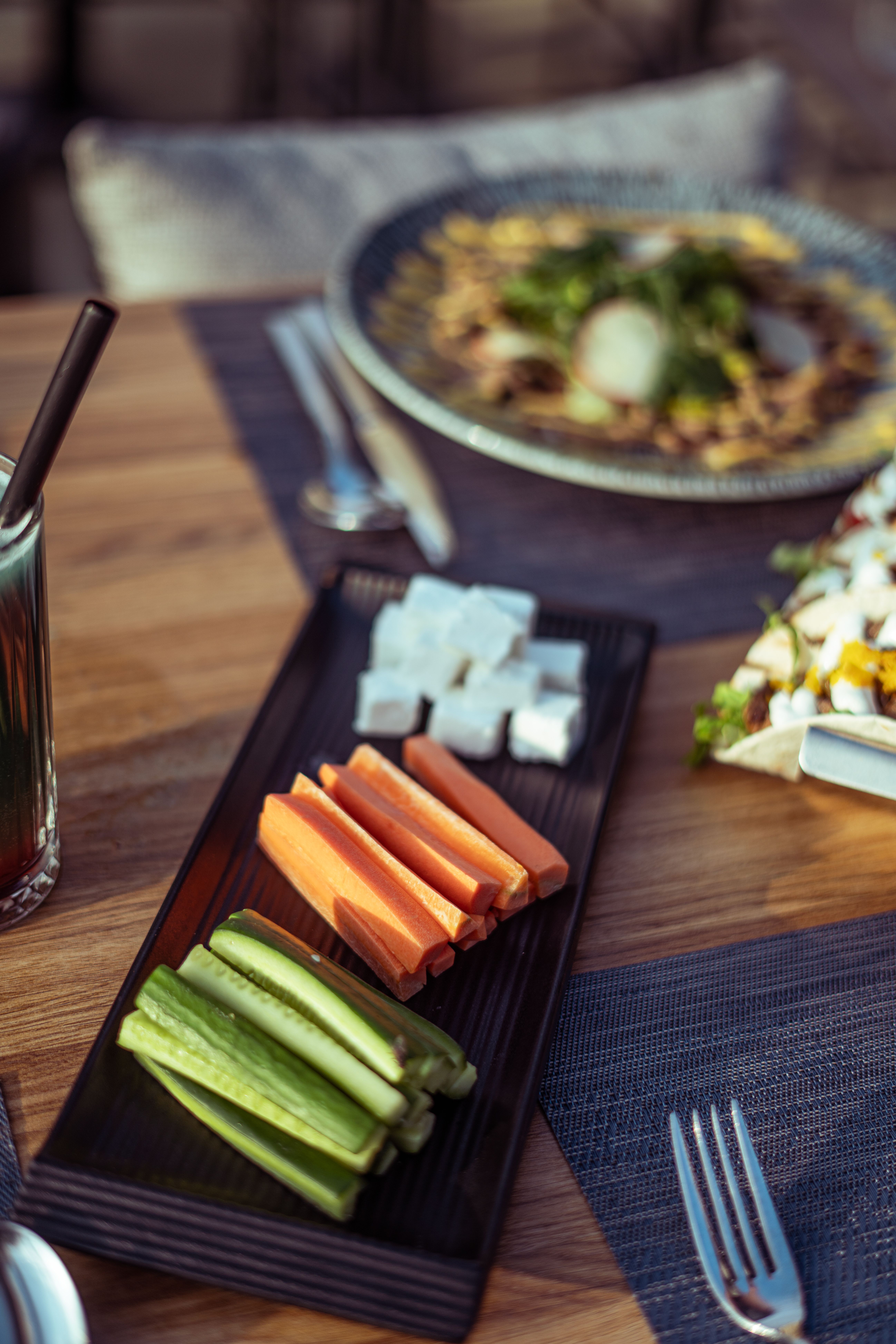 Colorful Vegetable Platter with Cheese on Rustic Table · Free Stock Photo