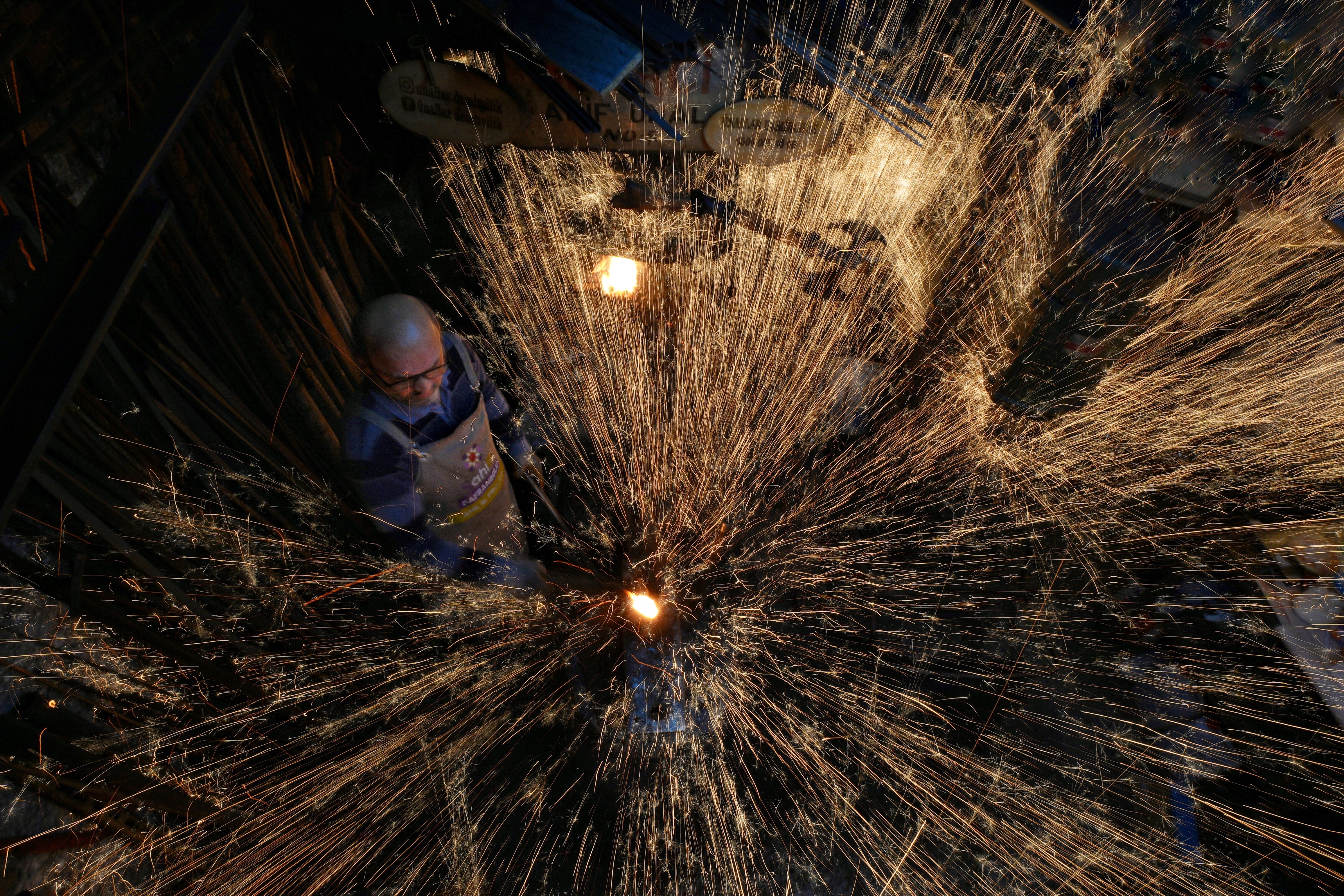 Blacksmith Crafting with Dynamic Iron Sparks in Türkiye · Free Stock Photo