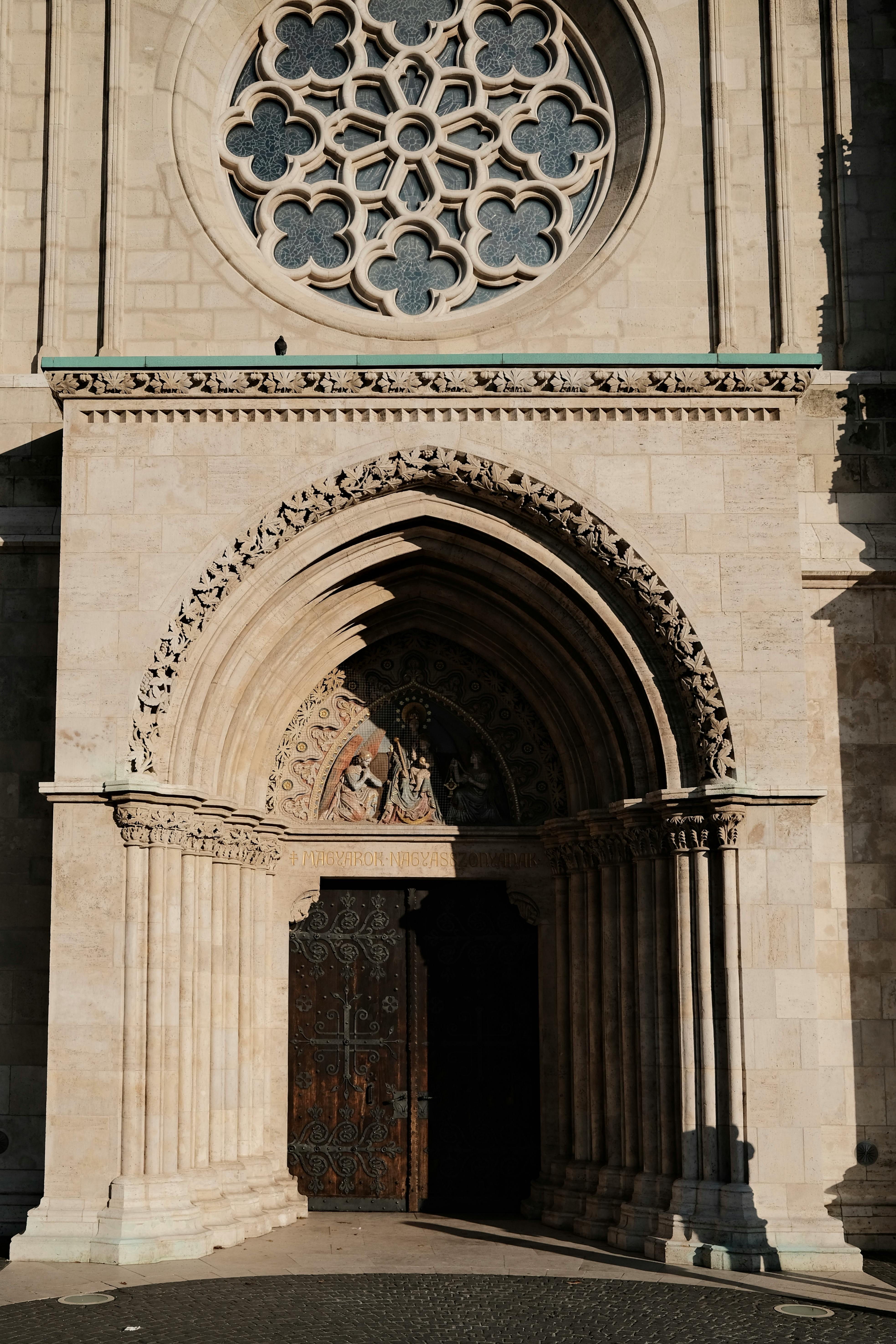 Gothic Cathedral Entrance with Intricate Stonework · Free Stock Photo