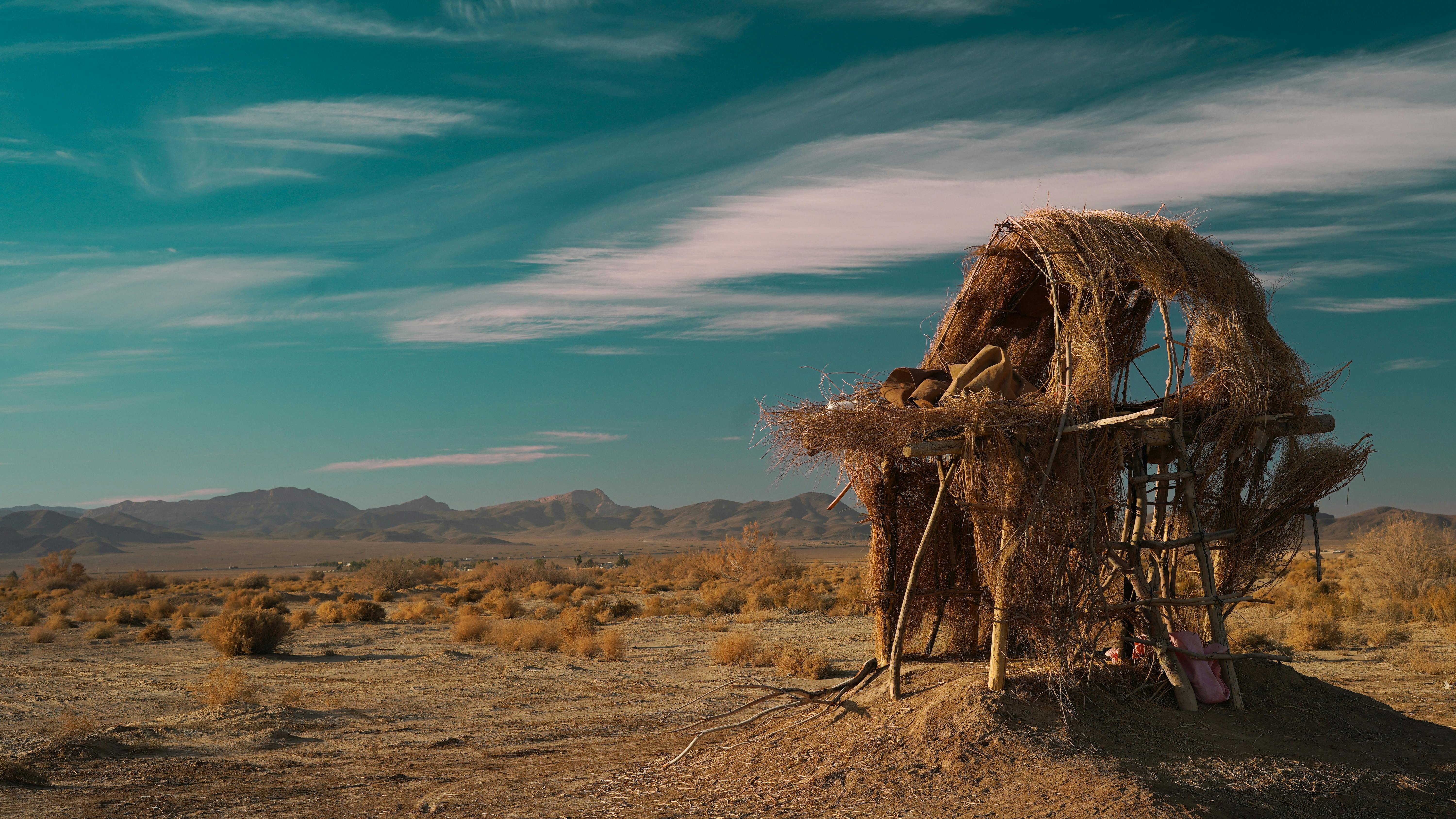 Rustic Desert Hut Under Blue Sky · Free Stock Photo