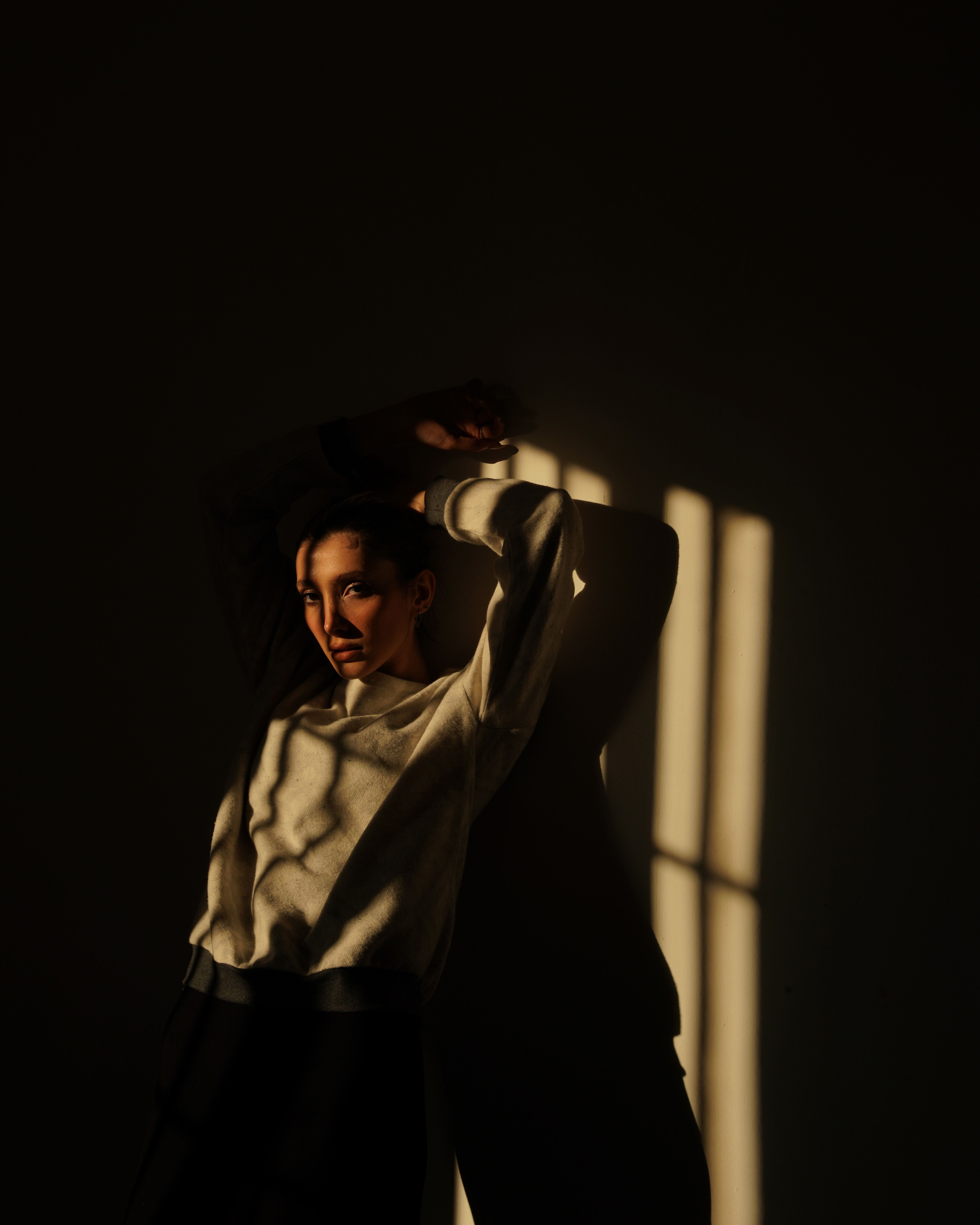Moody Portrait in Dramatic Shadows · Free Stock Photo