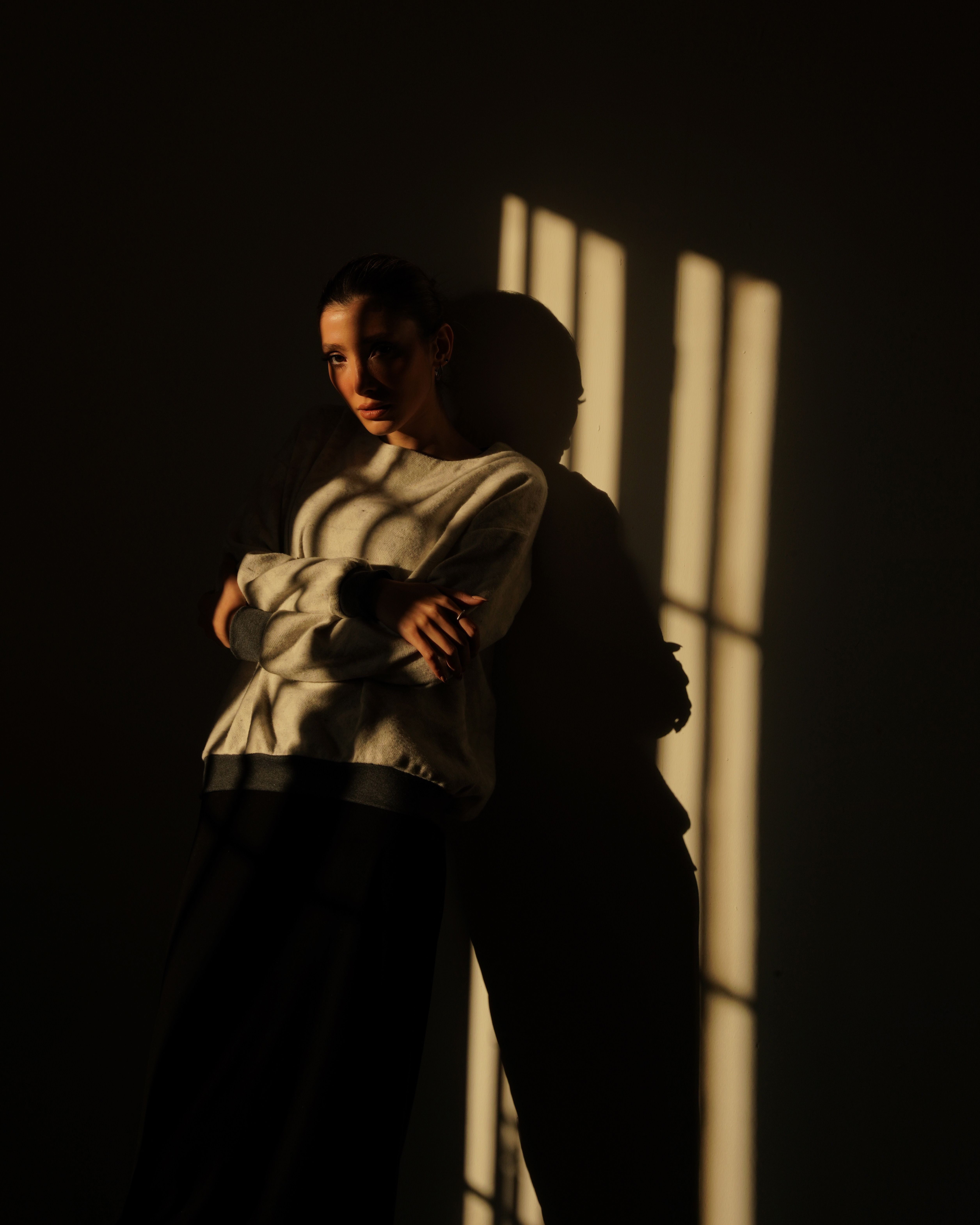 Moody Portrait with Dramatic Shadows and Light · Free Stock Photo