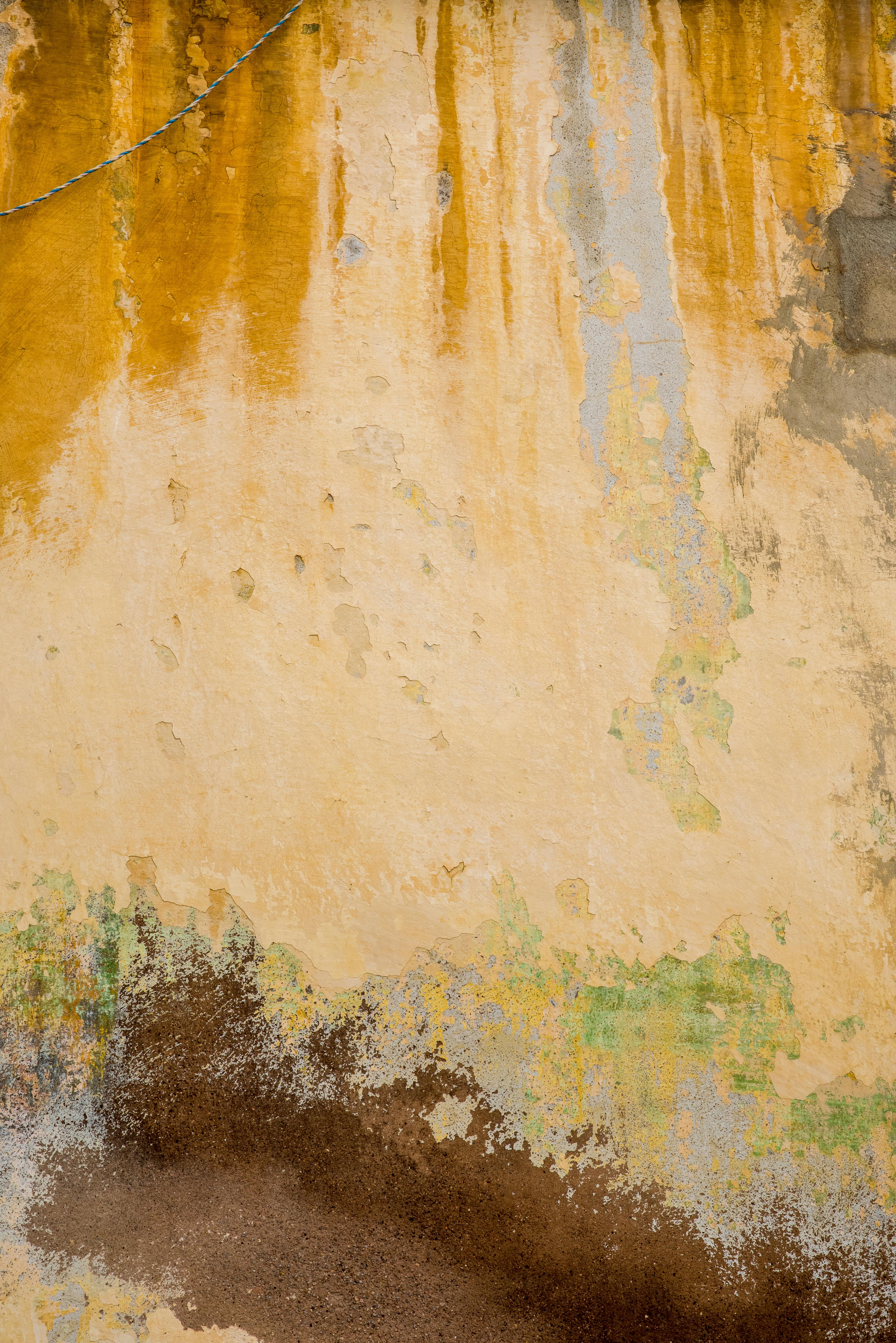 Abstract Weathered Wall Texture with Colorful Layers · Free Stock Photo