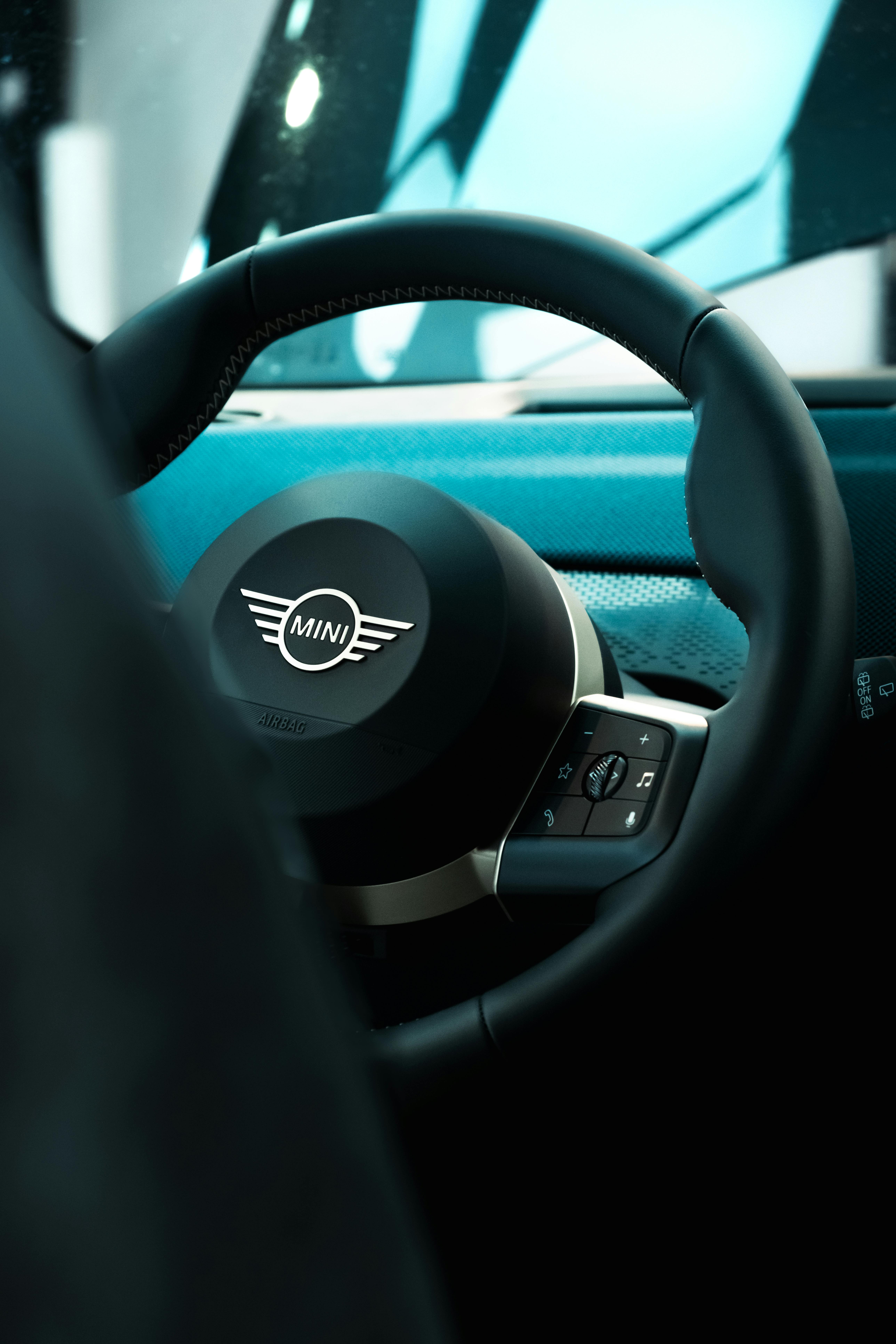 Close-up of Mini Steering Wheel in Car Interior · Free Stock Photo