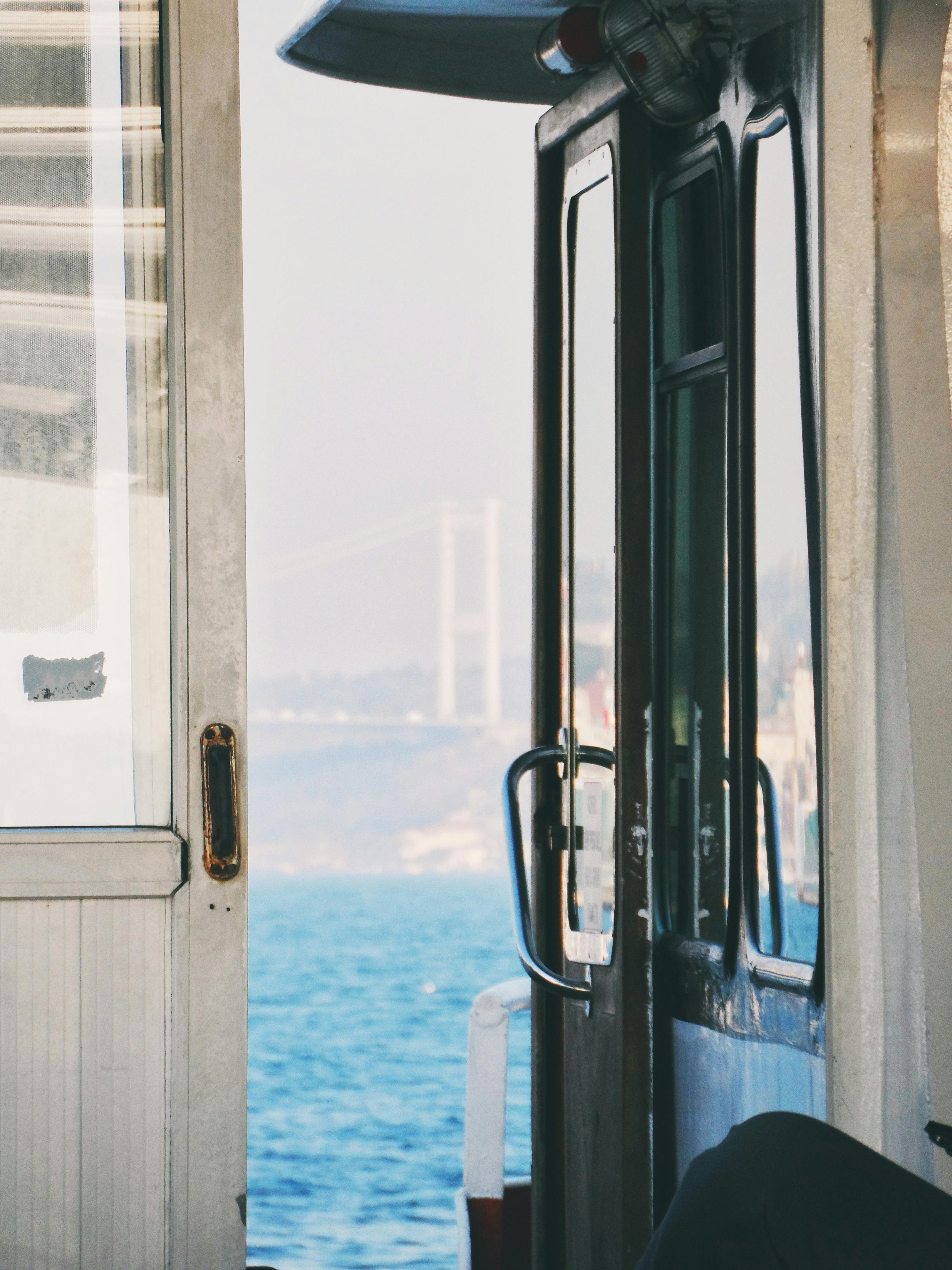 View of Suspension Bridge from Inside a Boat · Free Stock Photo