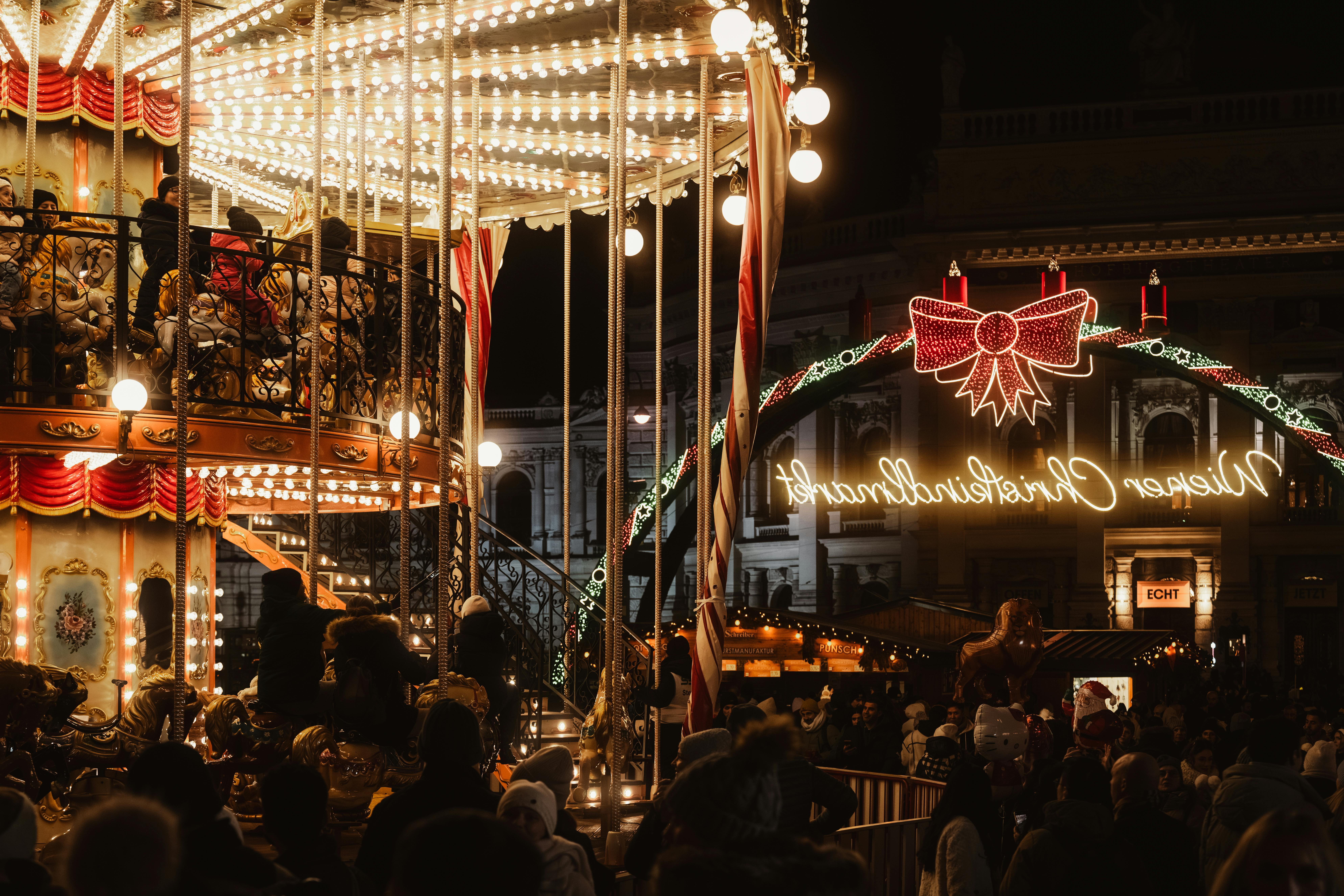 Festive Christmas Market Carousel at Night · Free Stock Photo
