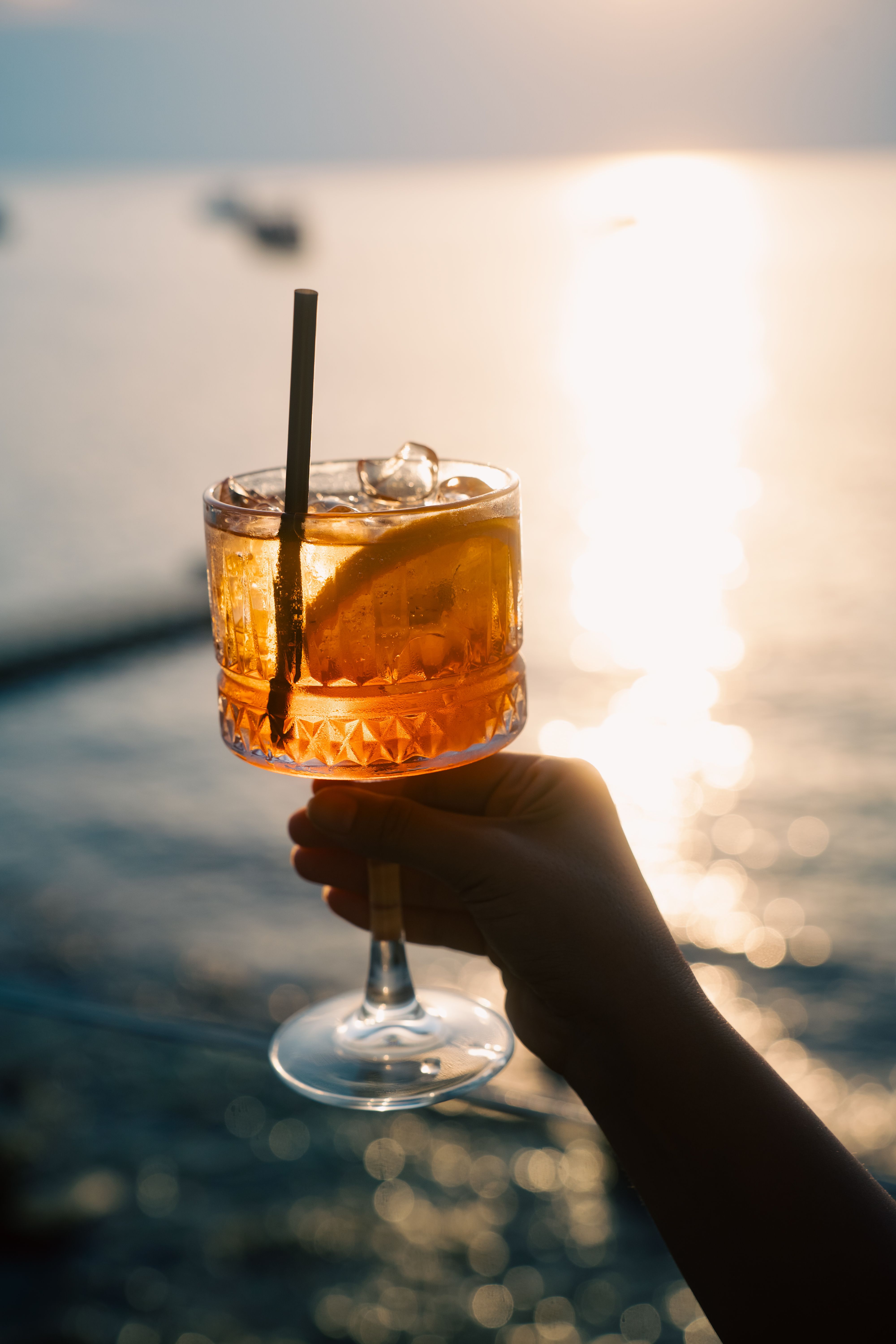 Elegant Cocktail by the Sea at Sunset · Free Stock Photo