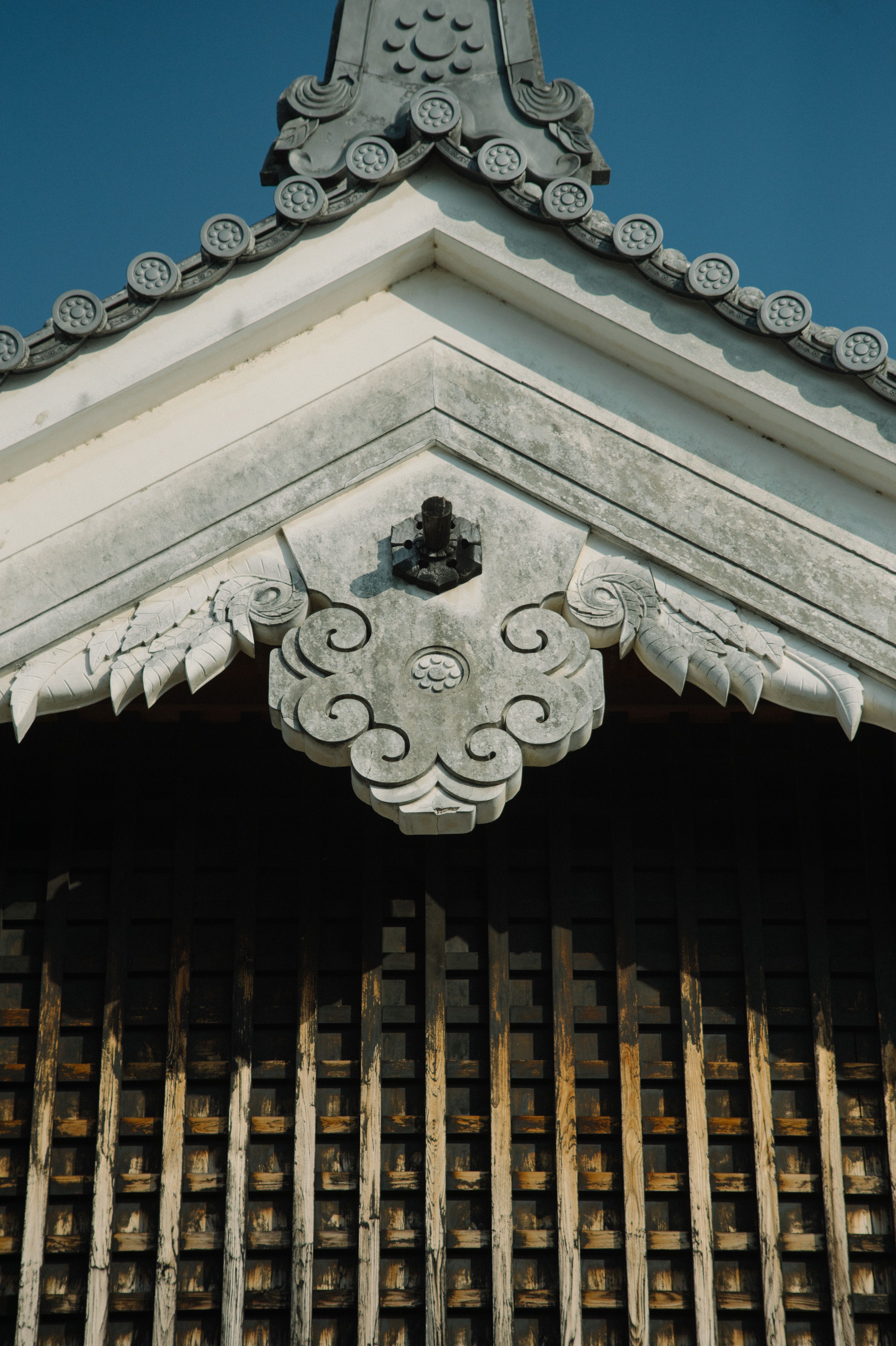 Traditional Japanese Architectural Details on Rooftop · Free Stock Photo