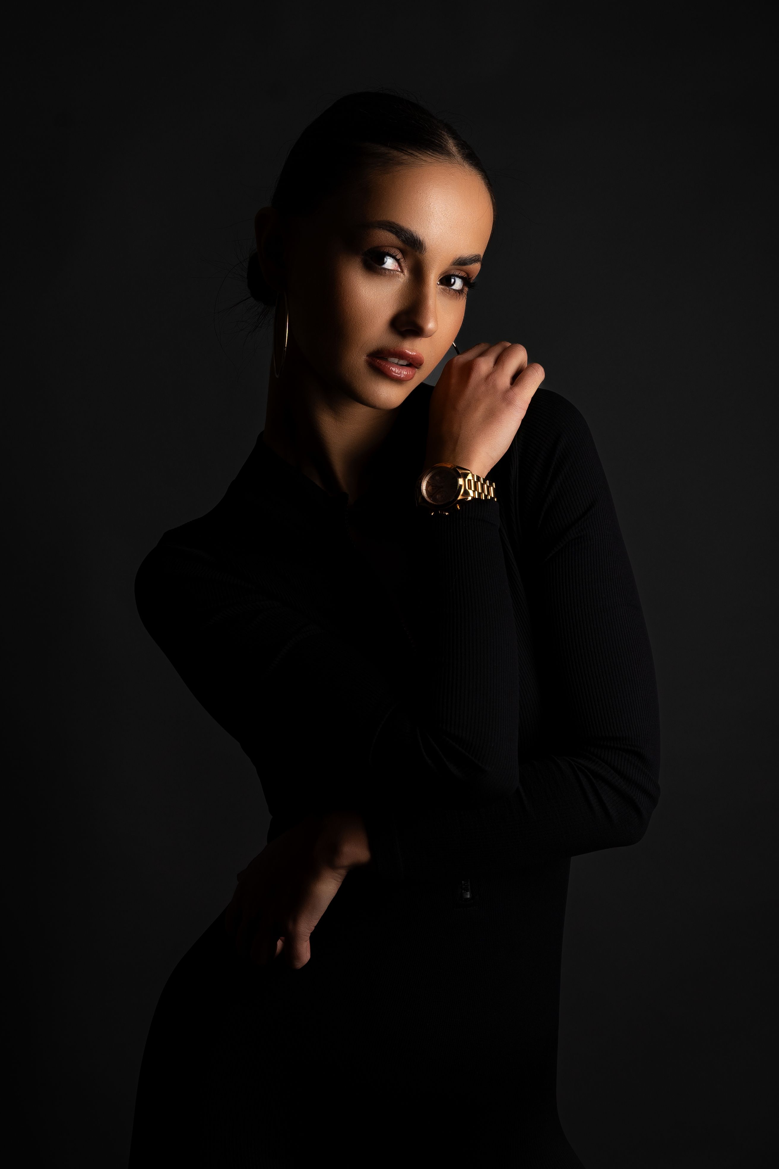 Elegant Female Portrait in Chic Black Fashion · Free Stock Photo