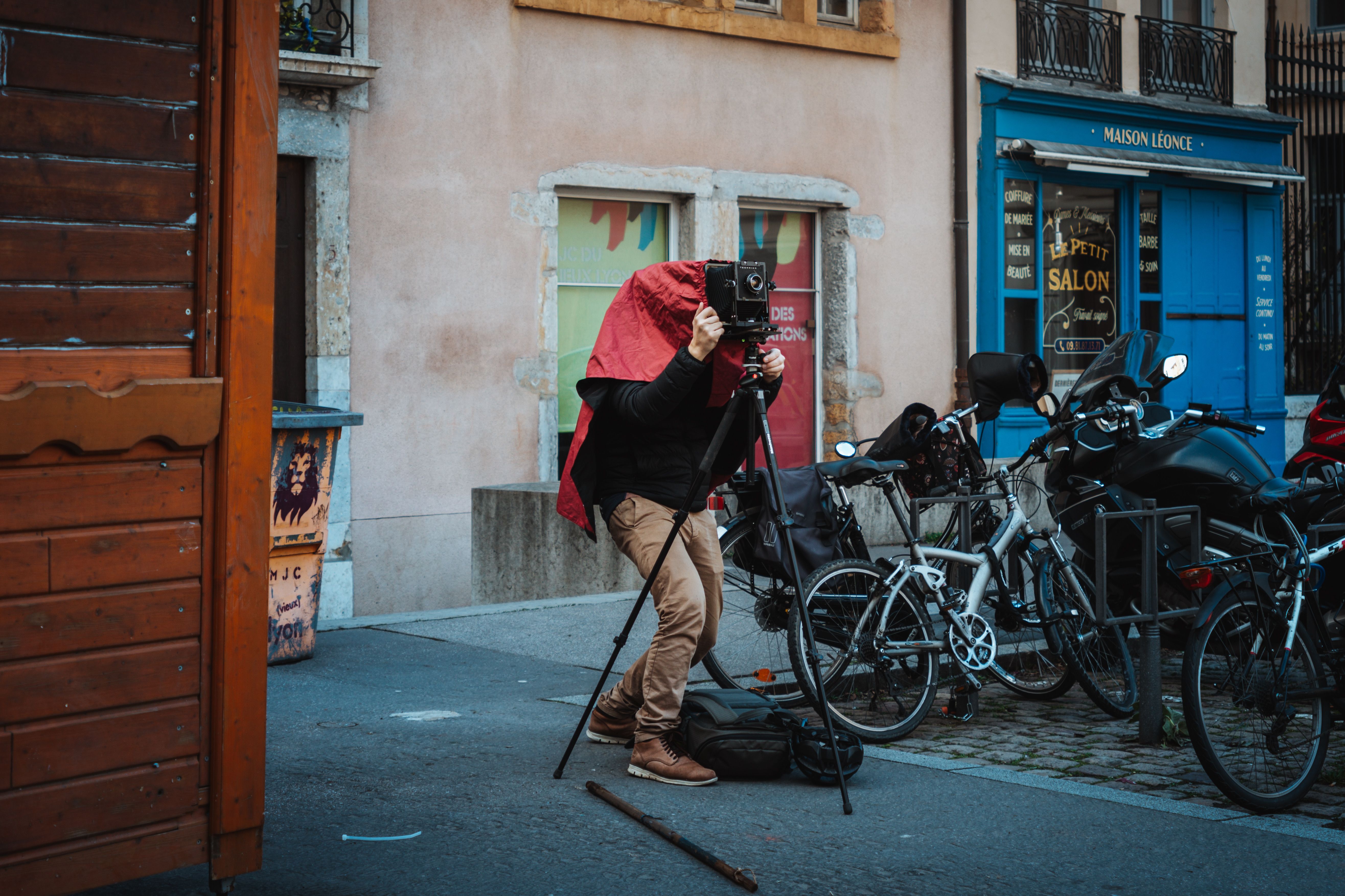 Street Photographer with Vintage Camera Setup · Free Stock Photo