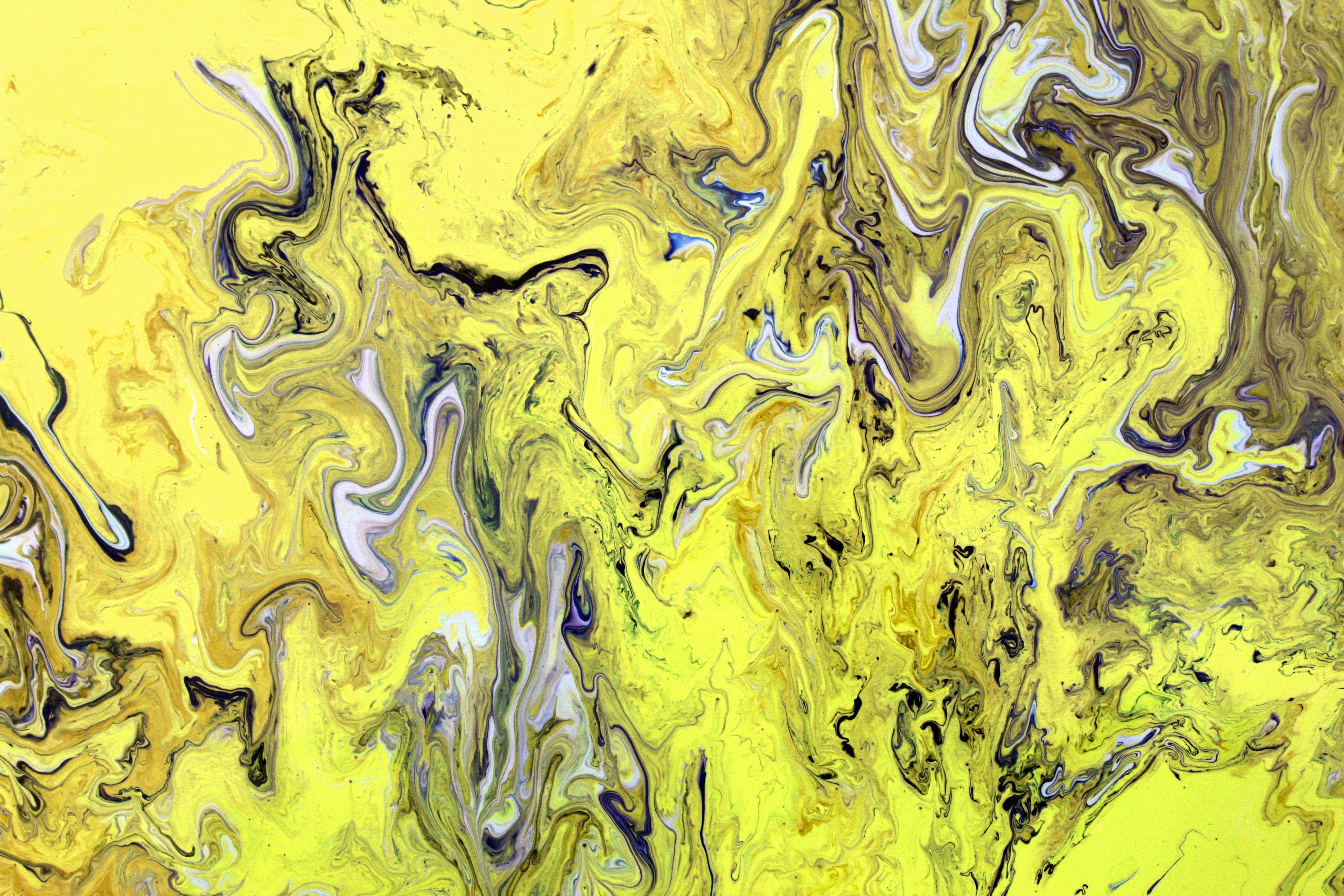 Vibrant Abstract Yellow and Black Paint Swirl Art · Free Stock Photo