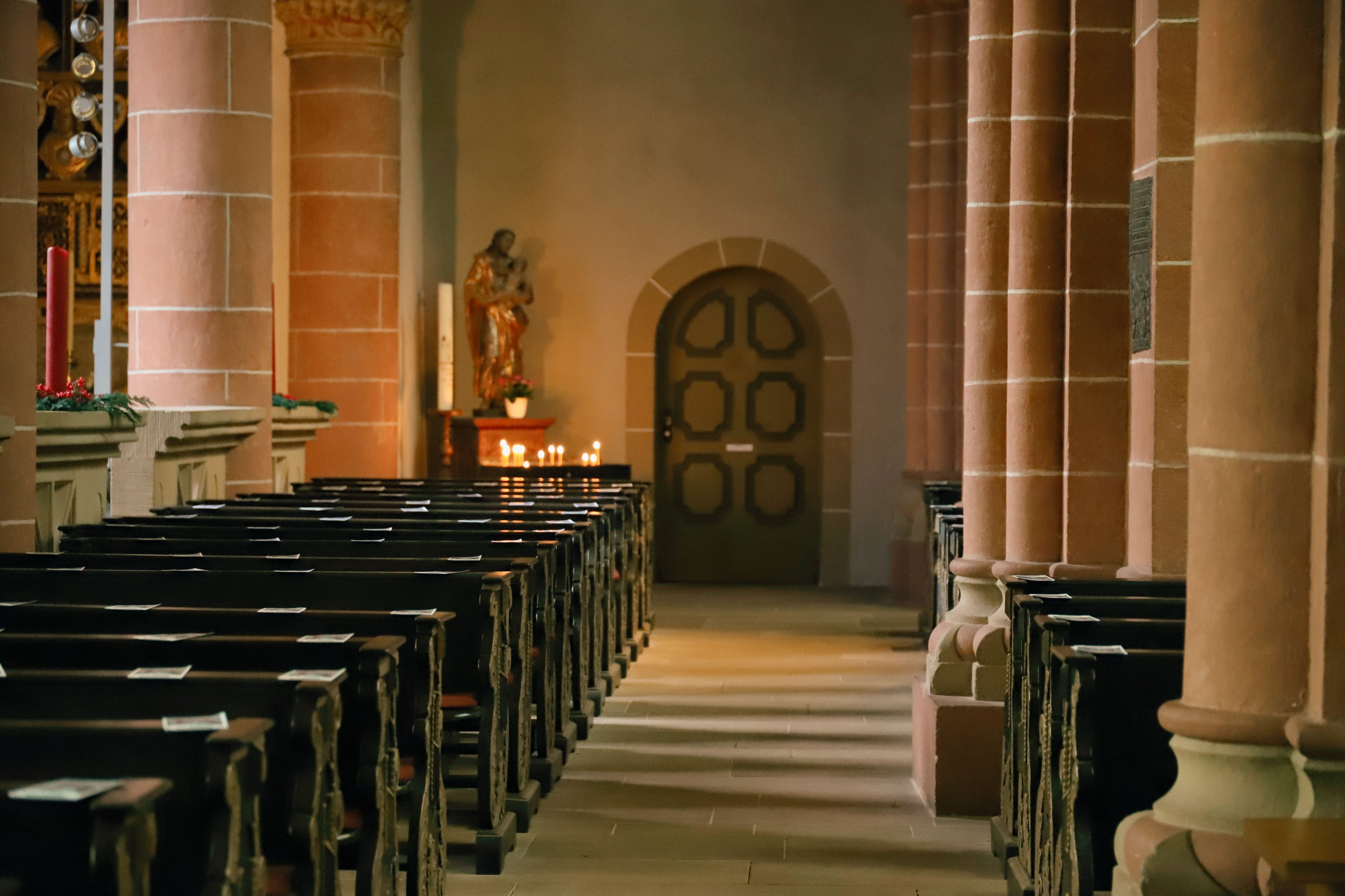 Serene Interior of Historic Catholic Church · Free Stock Photo
