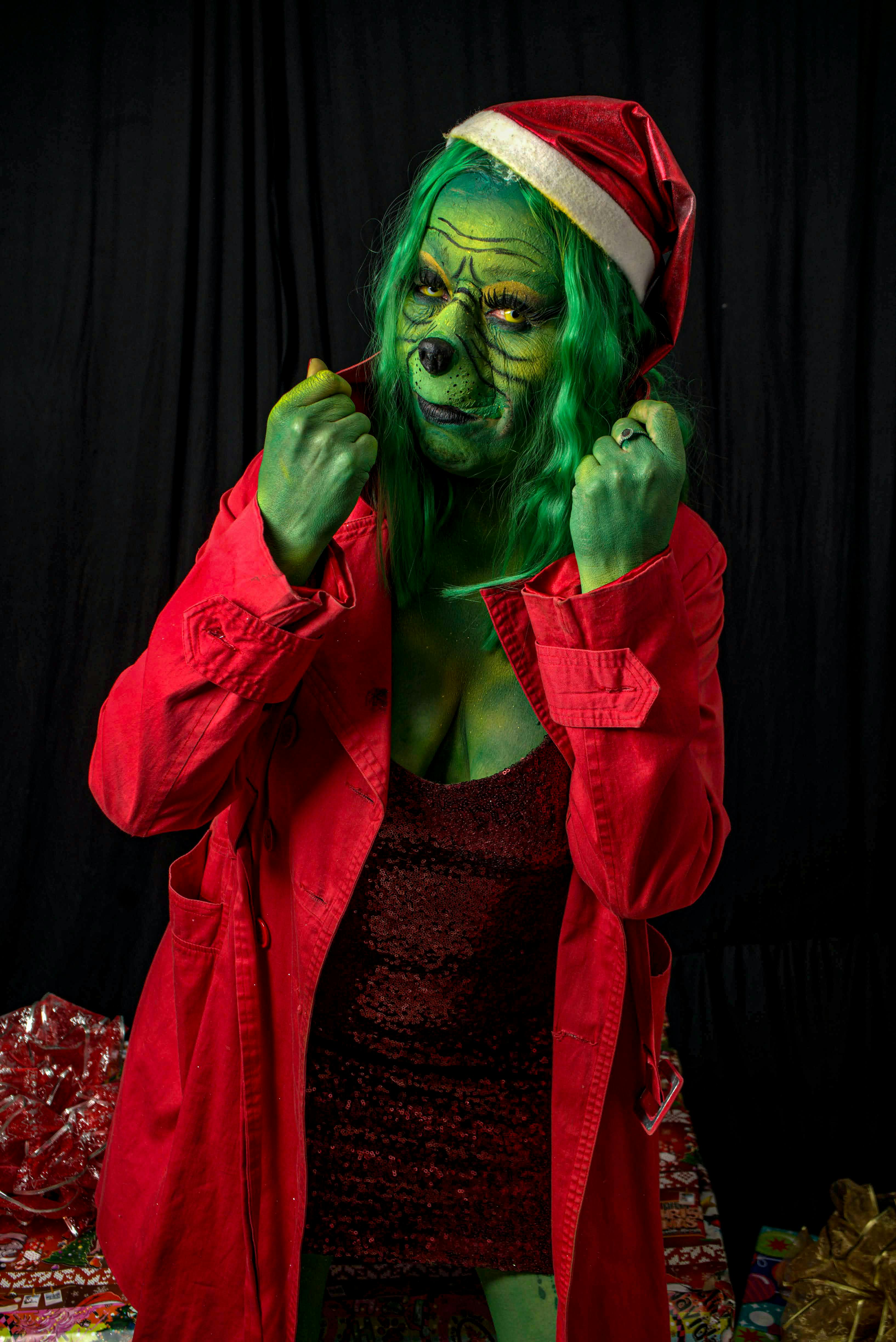 Festive Grinch-themed Costume Portrait · Free Stock Photo