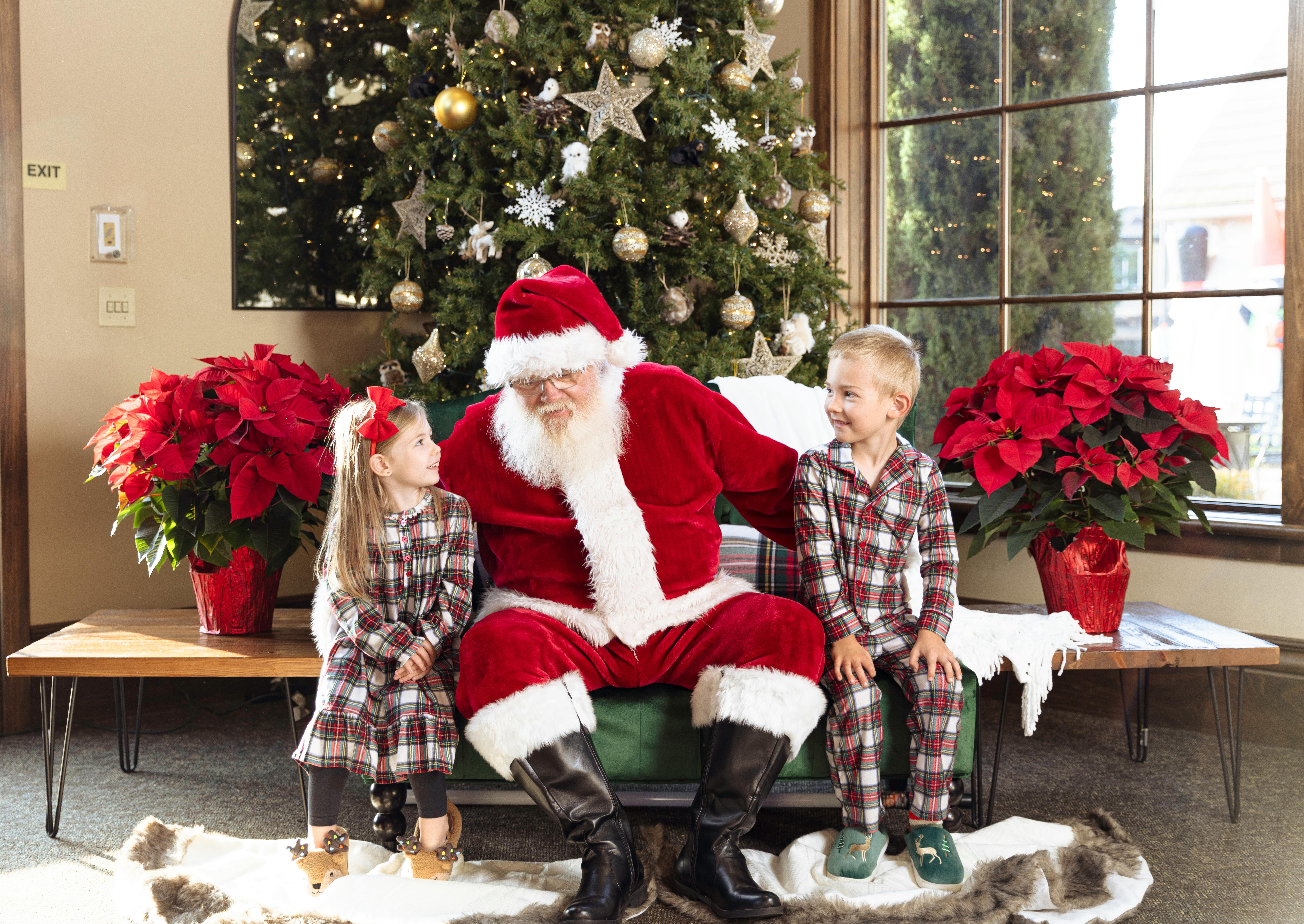 Santa with Children Celebrating Christmas Indoors · Free Stock Photo