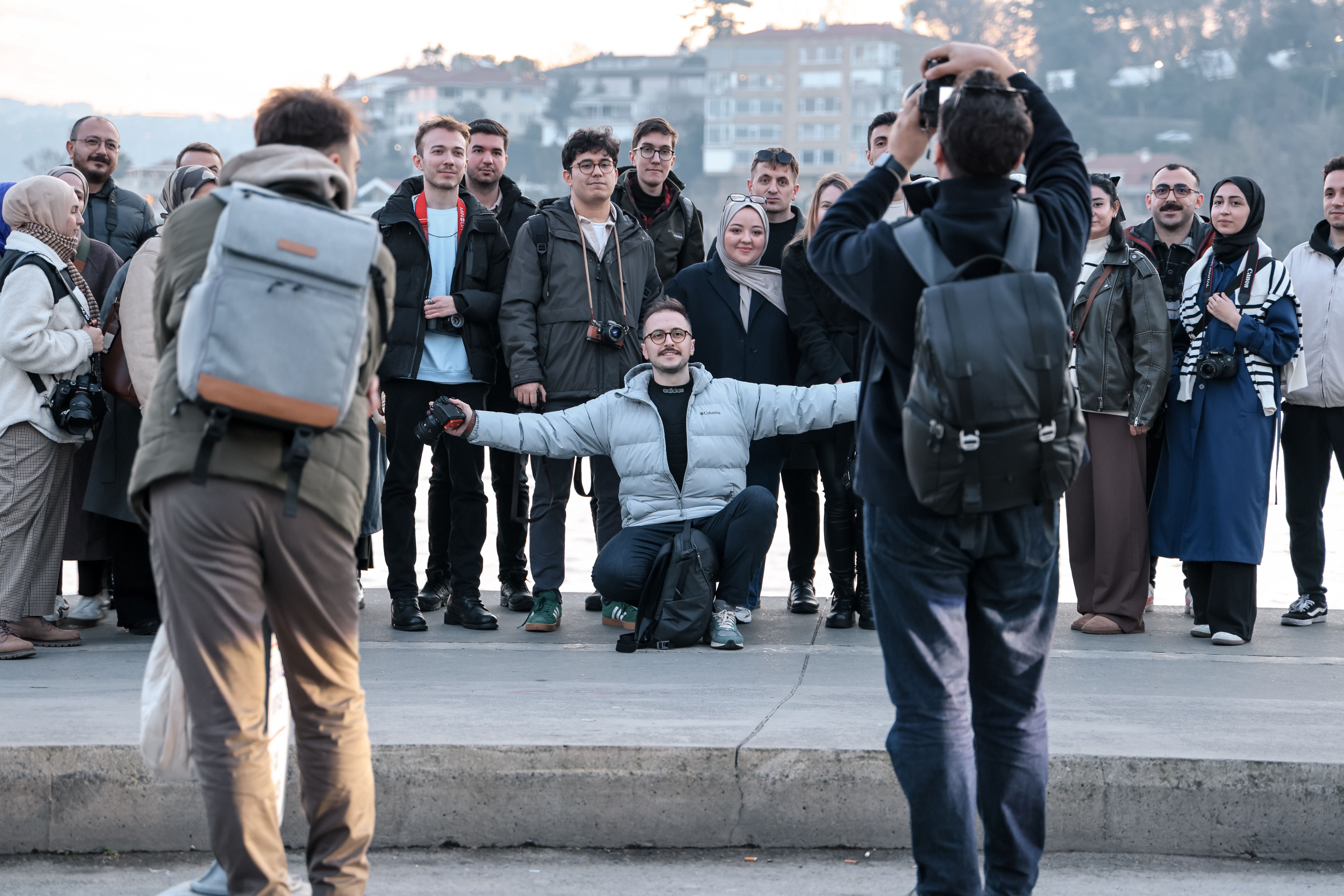Group of Tourists Posing Outdoors · Free Stock Photo