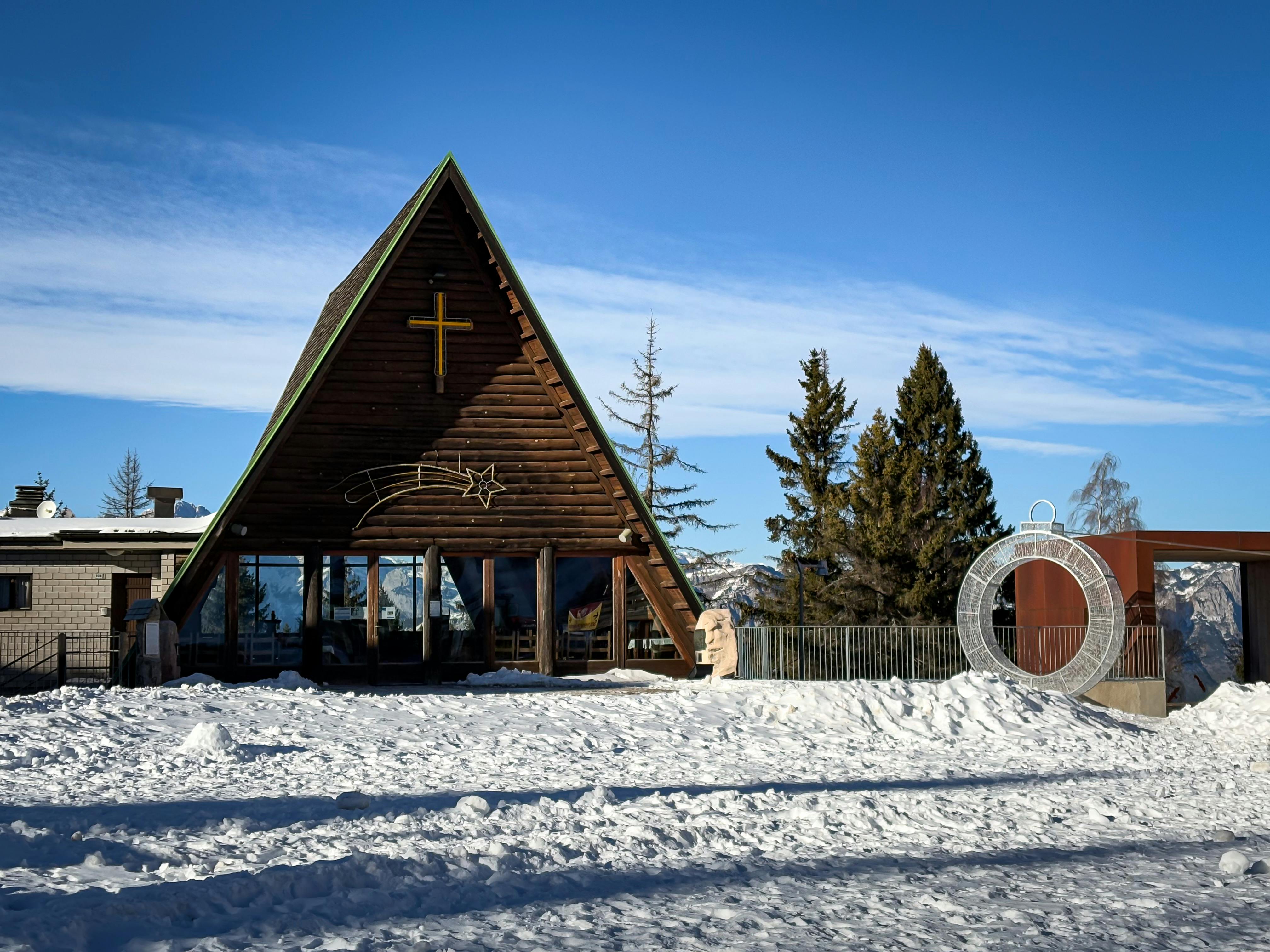 Charming Alpine Chapel in Snowy Mountain Landscape · Free Stock Photo