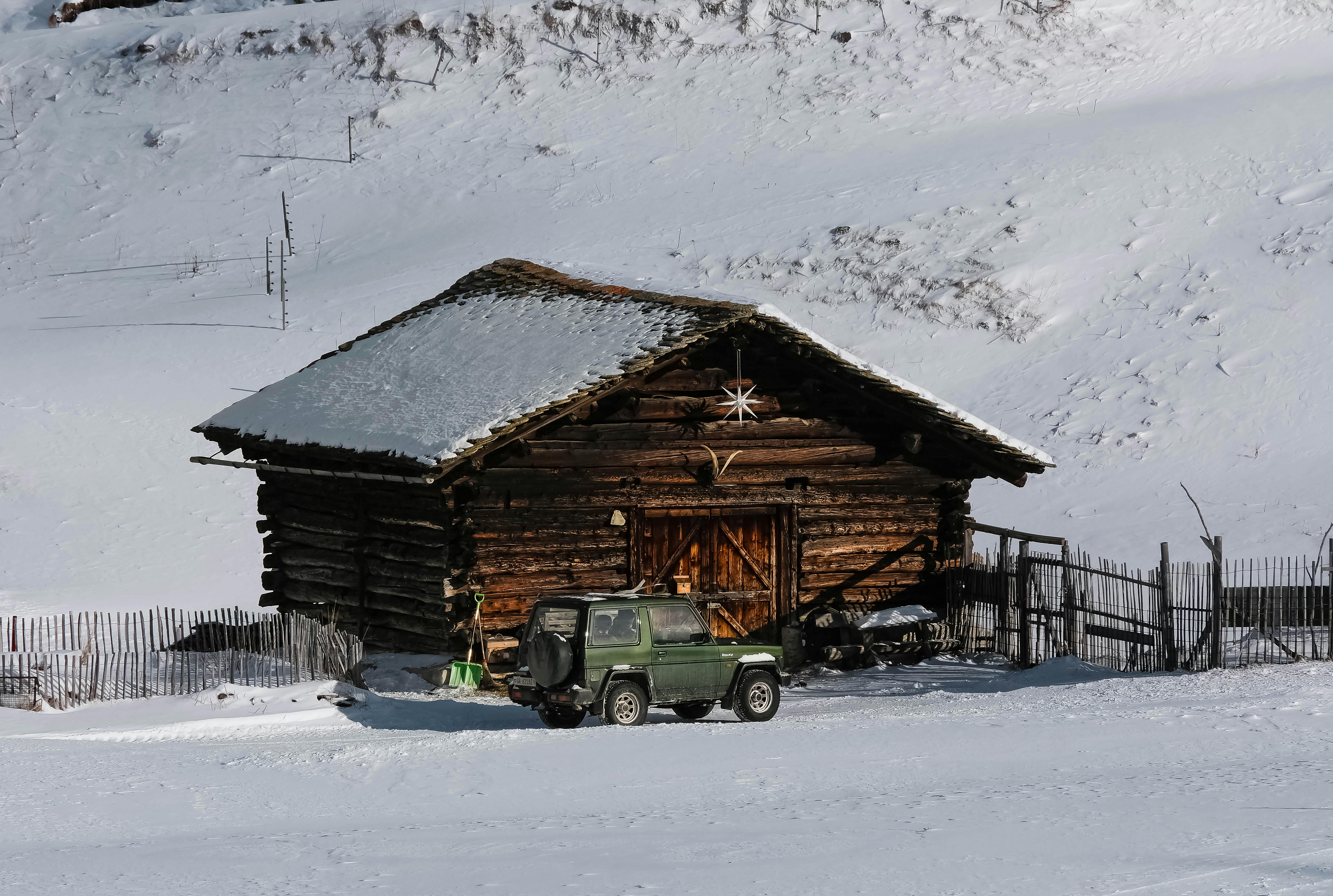 Rustic Snow-Covered Cabin in Sils, Switzerland · Free Stock Photo