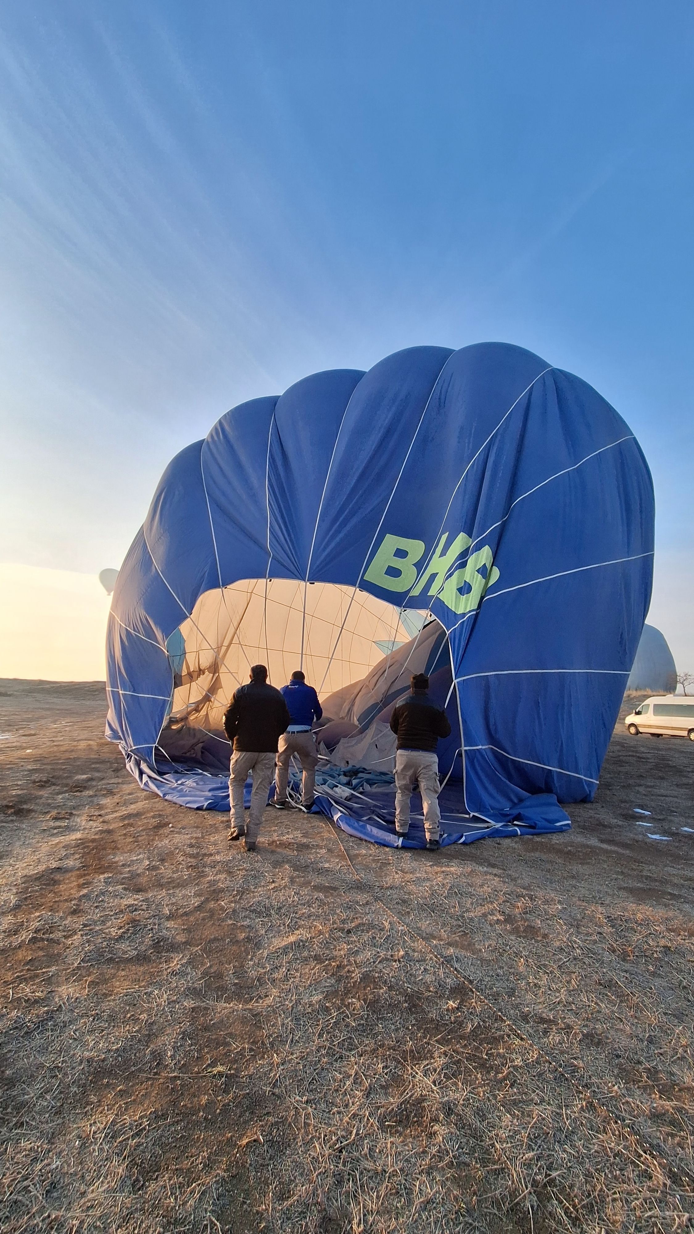 Preparing Hot Air Balloon for Takeoff at Sunrise · Free Stock Photo