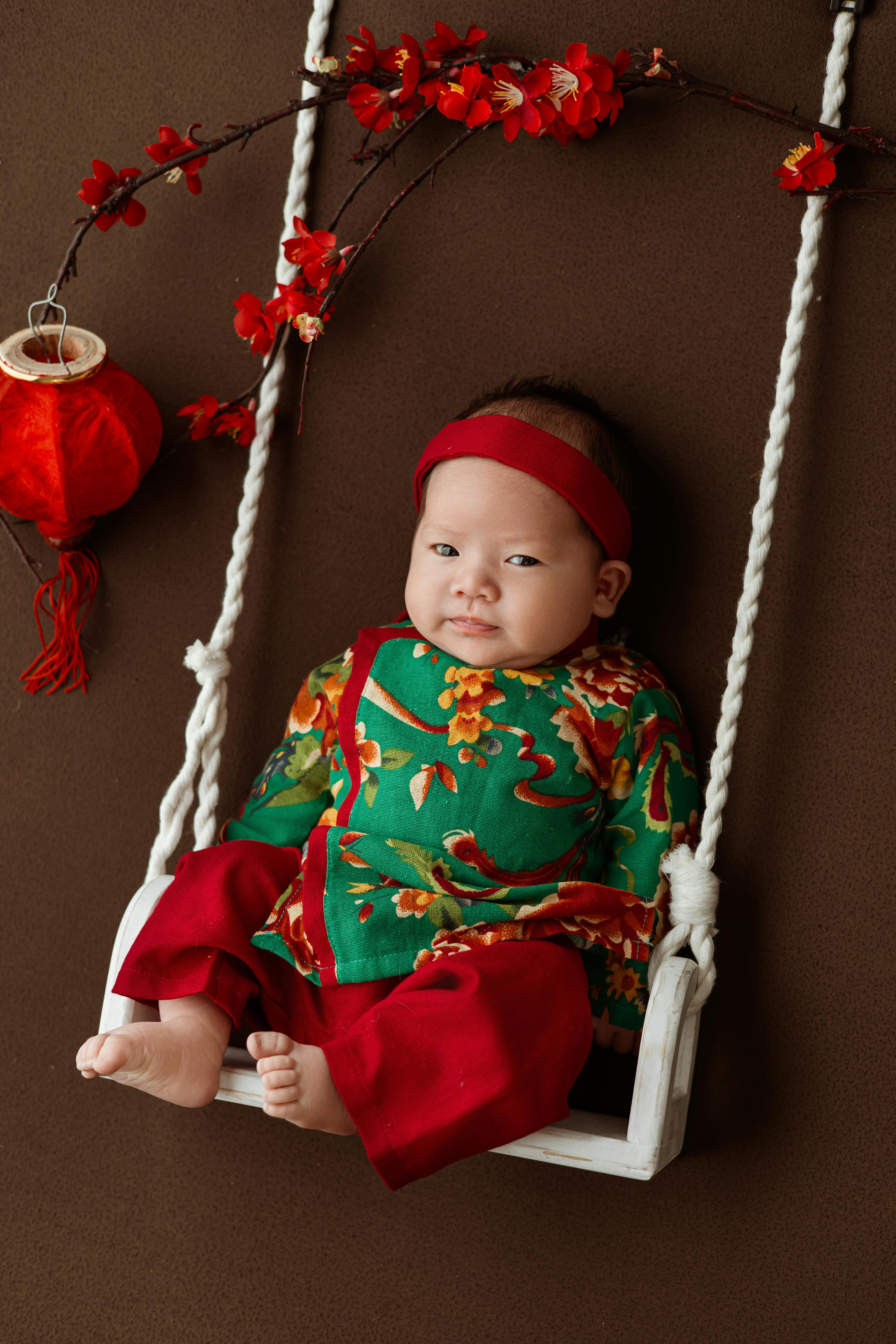 Adorable Baby in Traditional Vietnamese Attire · Free Stock Photo